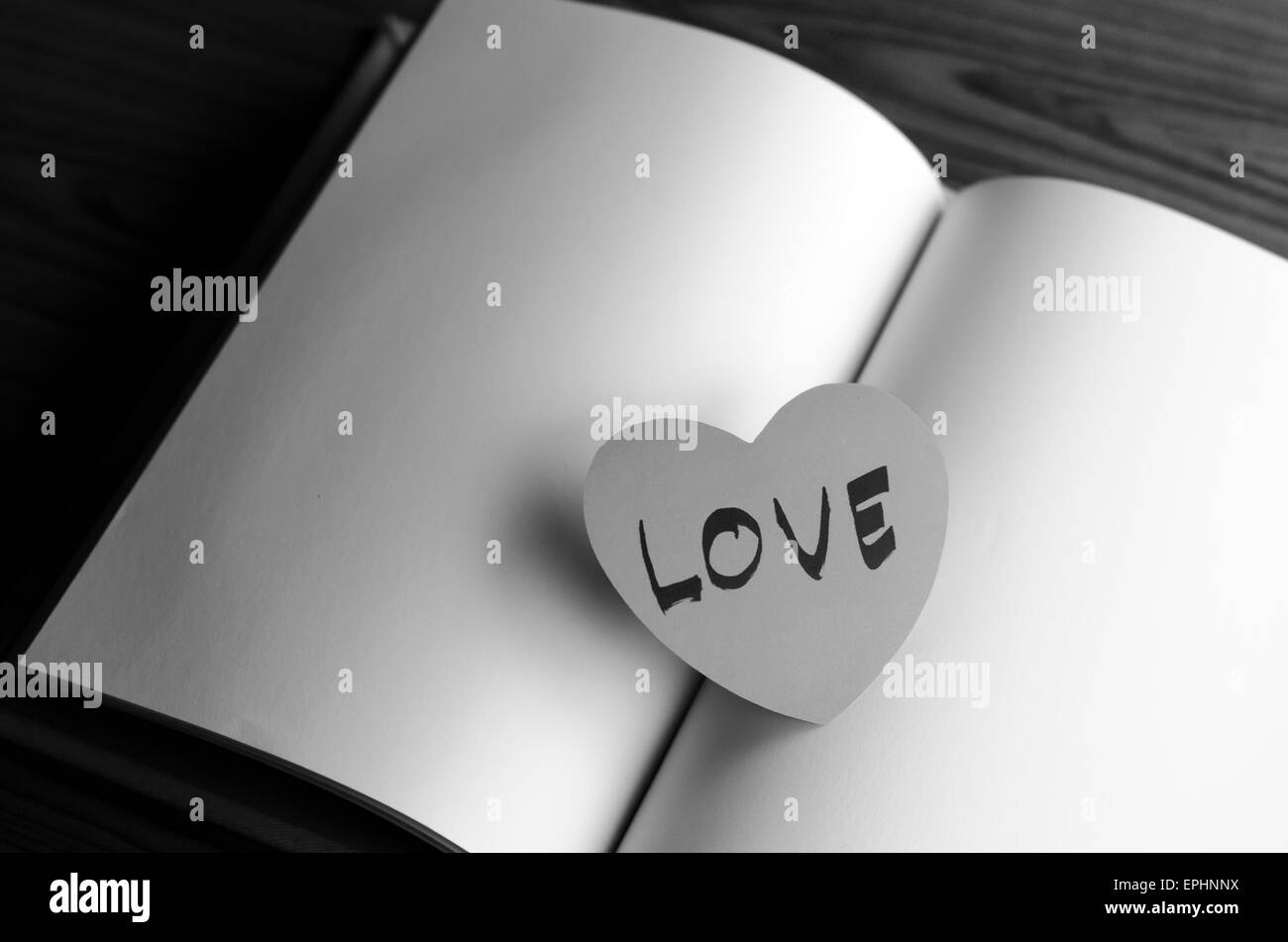 black and white paper heart write love word word Stock Photo - Alamy