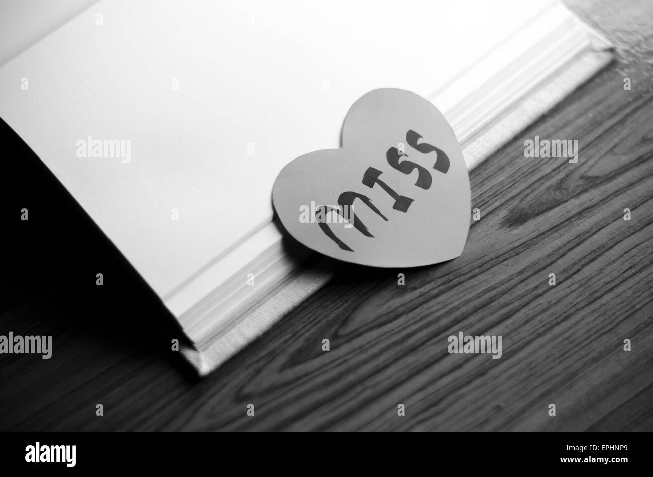 black and white paper heart write miss word word word Stock Photo - Alamy