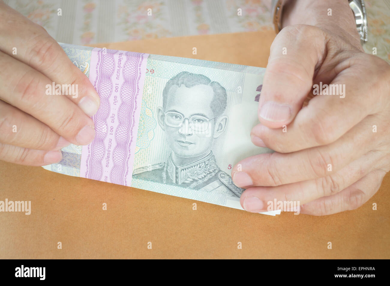 Counting thai baht hi-res stock photography and images - Alamy