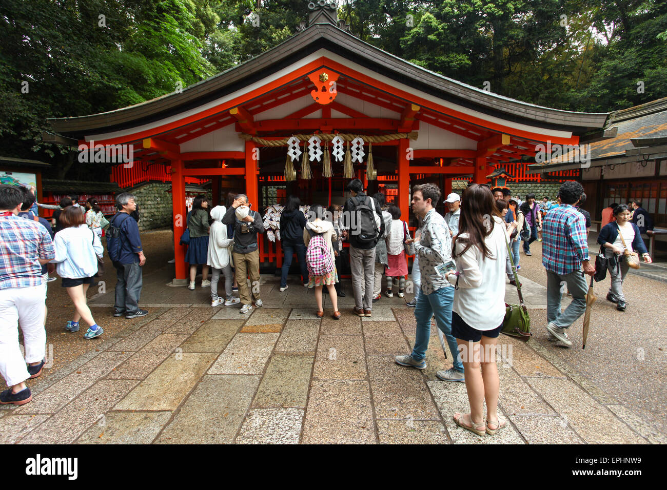 Japanese people and tourists enter Fushimi Inari Shrine in Kyoto Stock ...