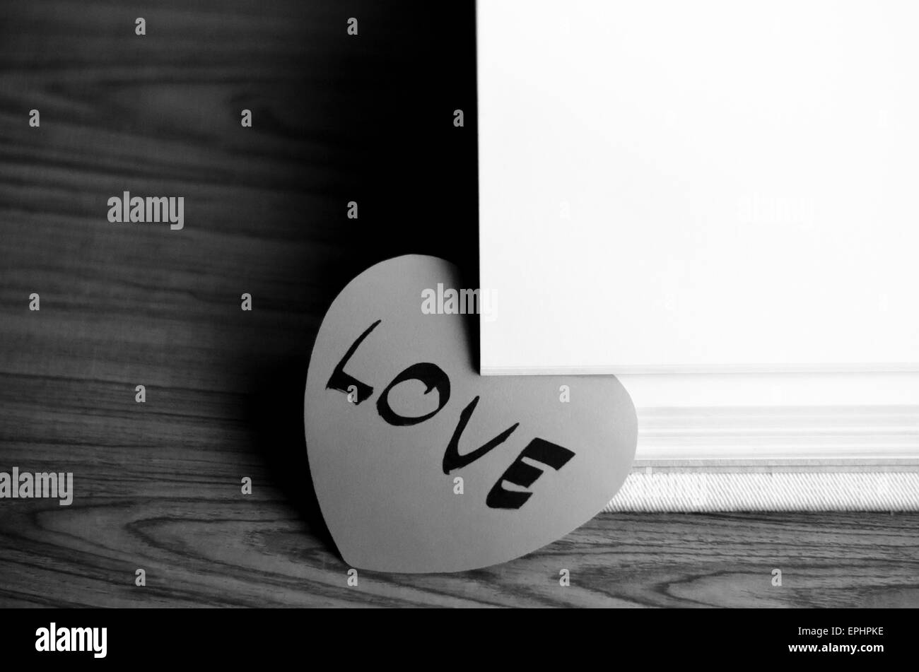 black and white paper heart write love word word Stock Photo - Alamy