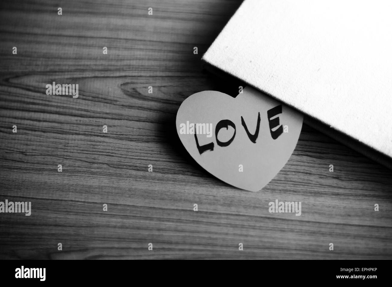 black and white paper heart write love word word Stock Photo - Alamy