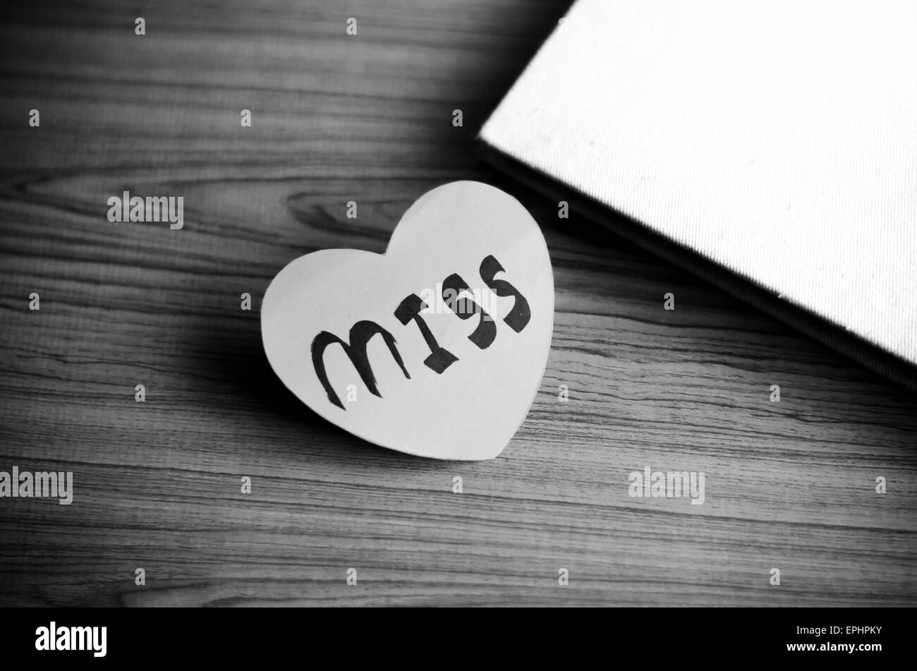 black and white paper heart write miss word word word Stock Photo - Alamy