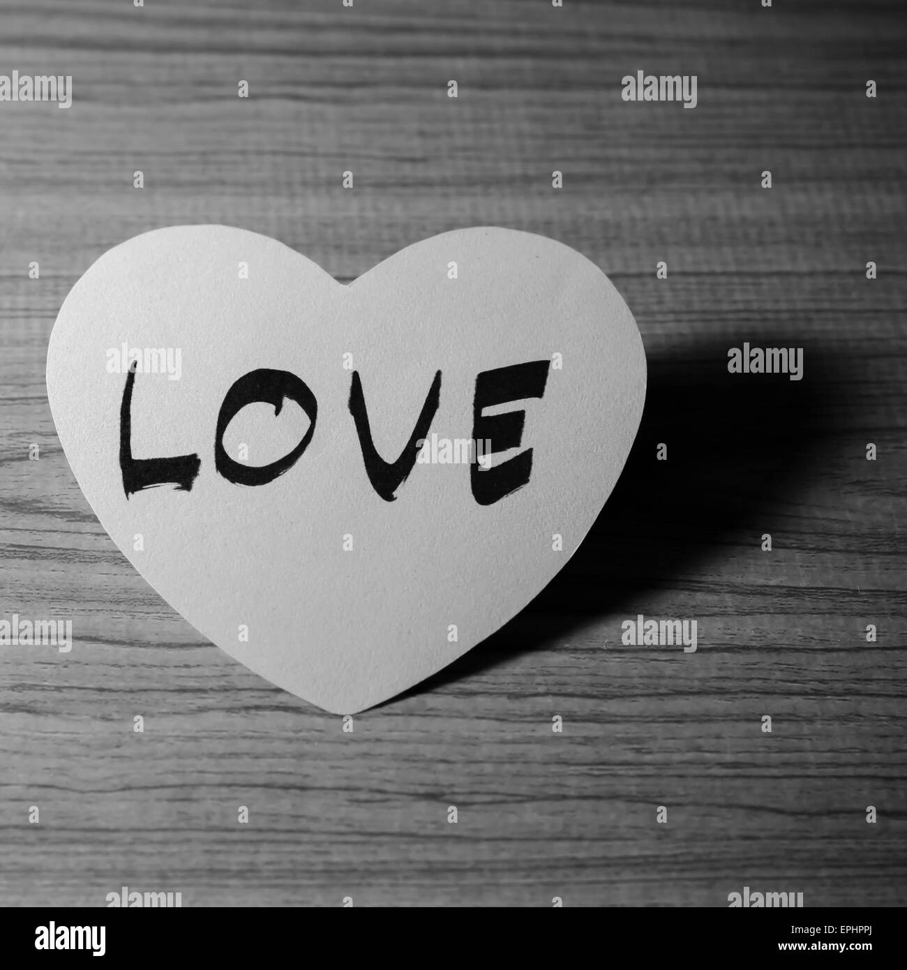 black and white paper heart write love word Stock Photo - Alamy