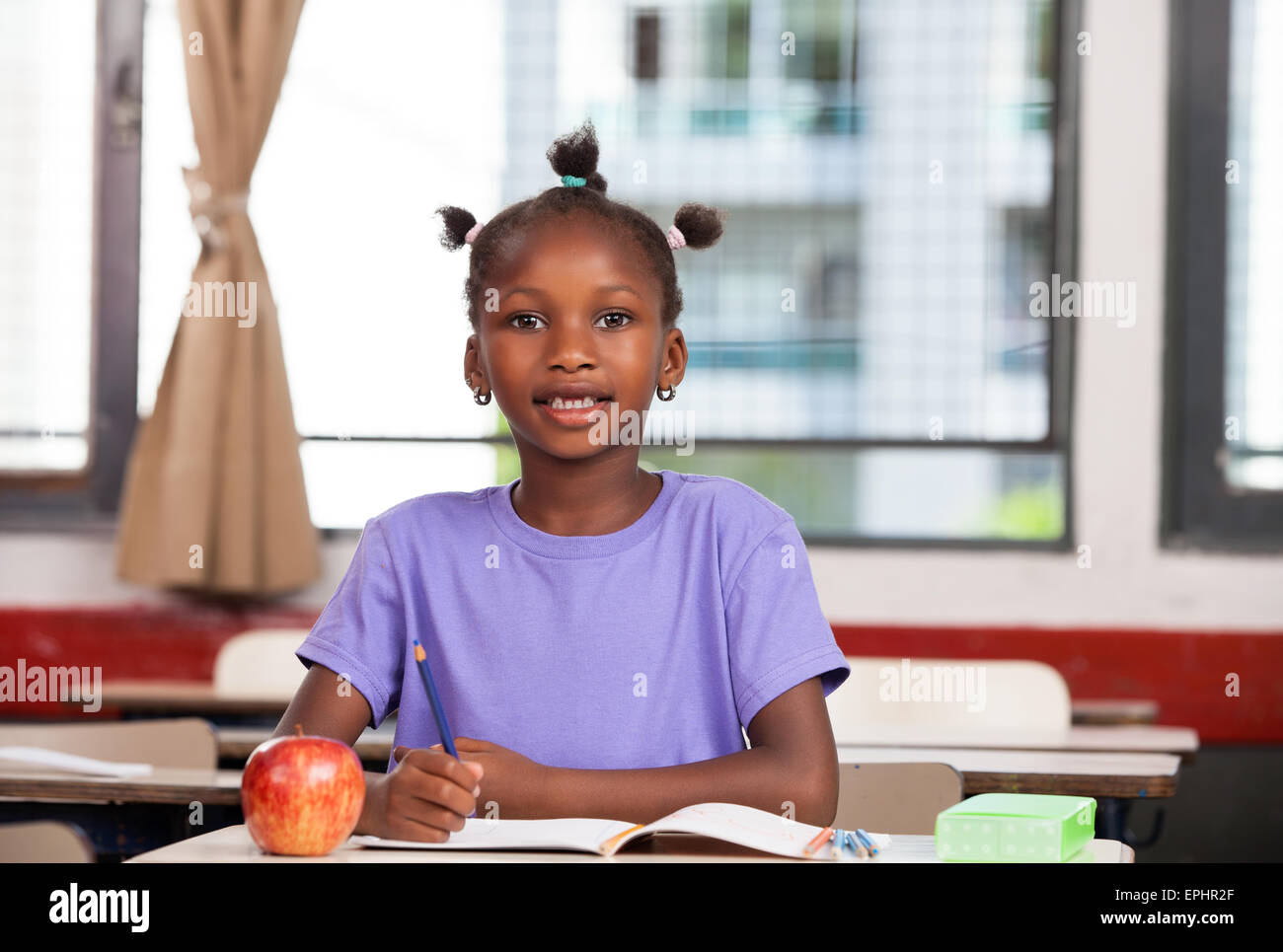 Afro american girl in elementary school Stock Photo - Alamy
