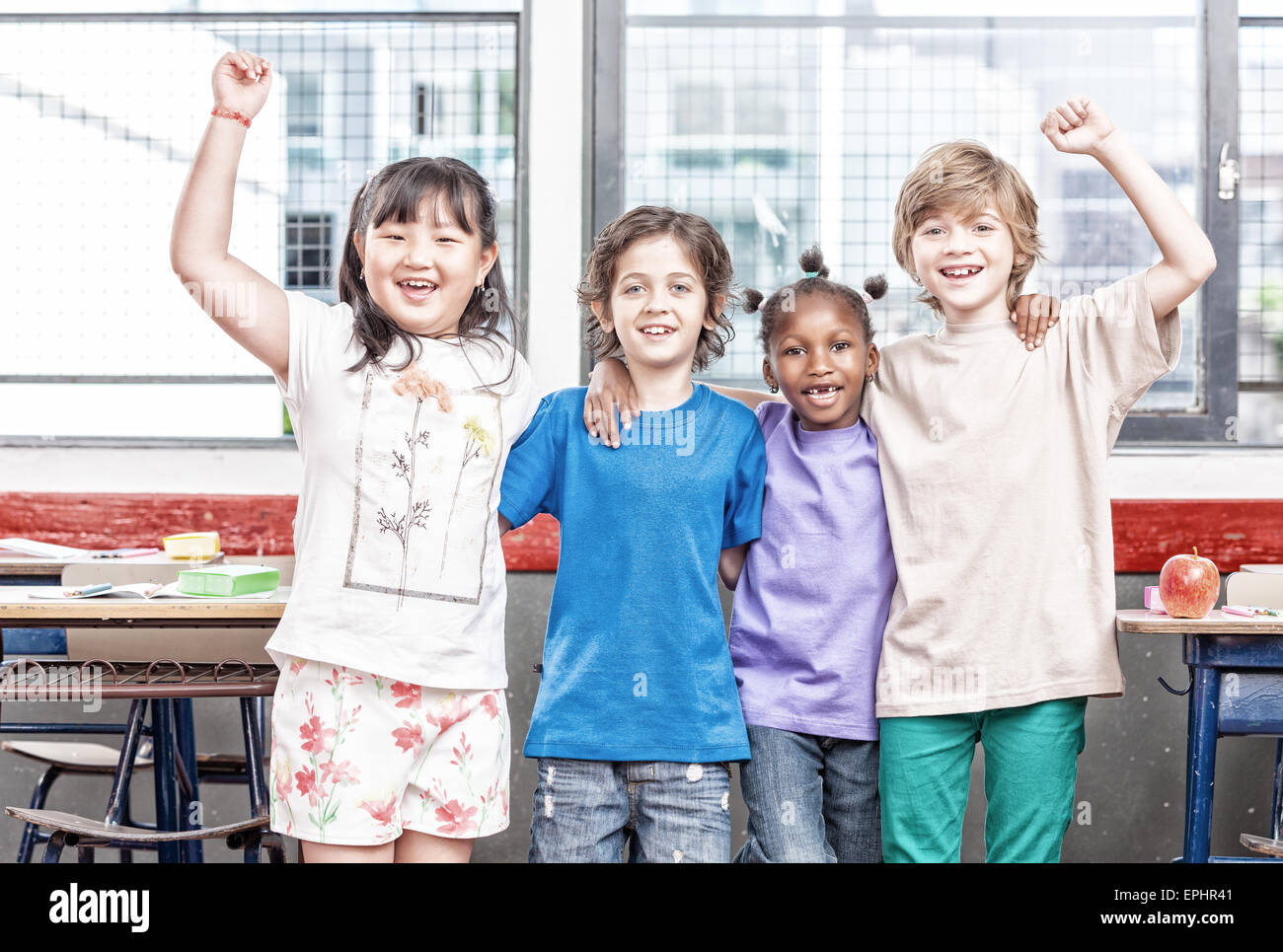 Happy school scene. Elementary class Stock Photo - Alamy