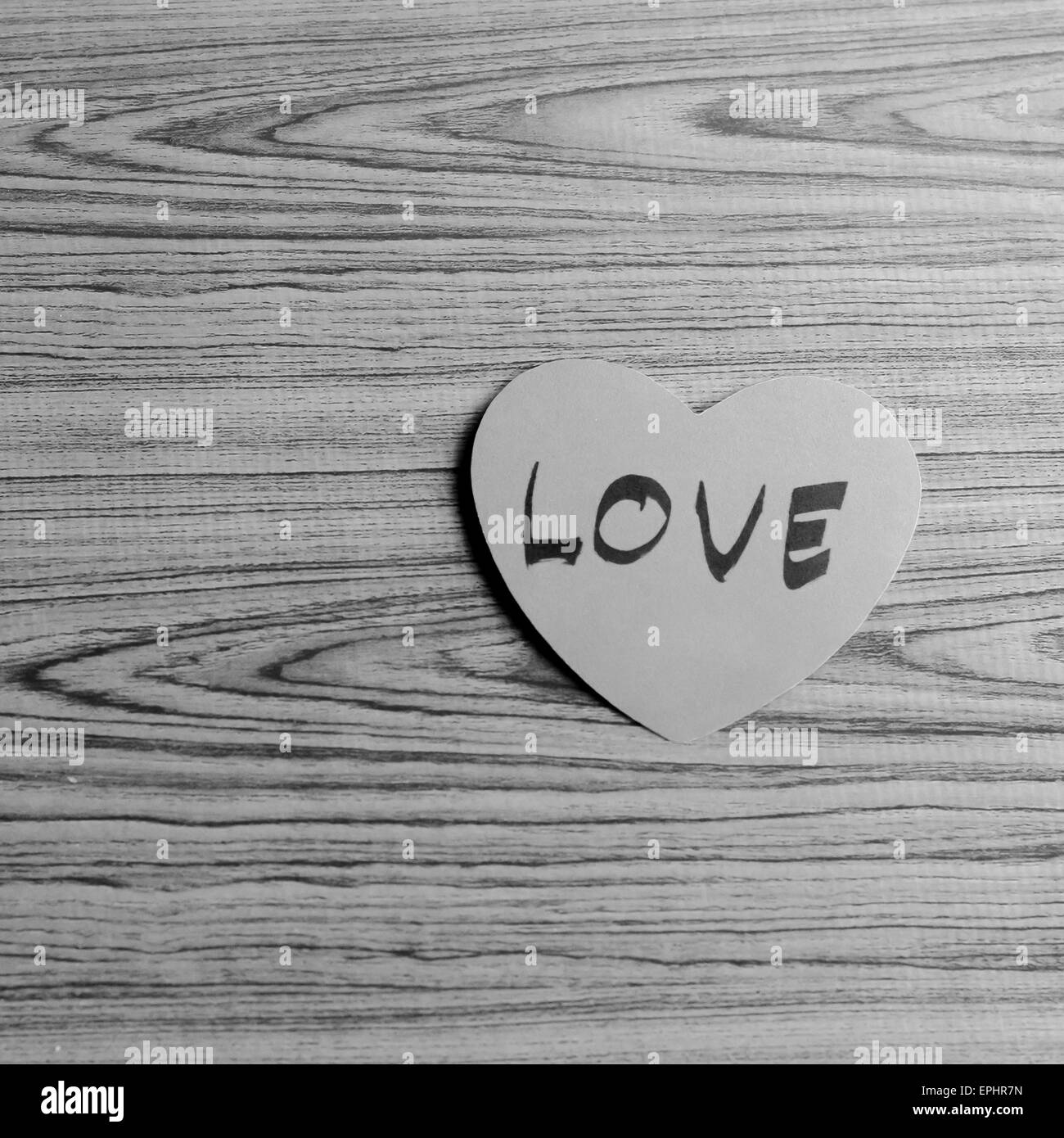 black and white paper heart write love word Stock Photo - Alamy