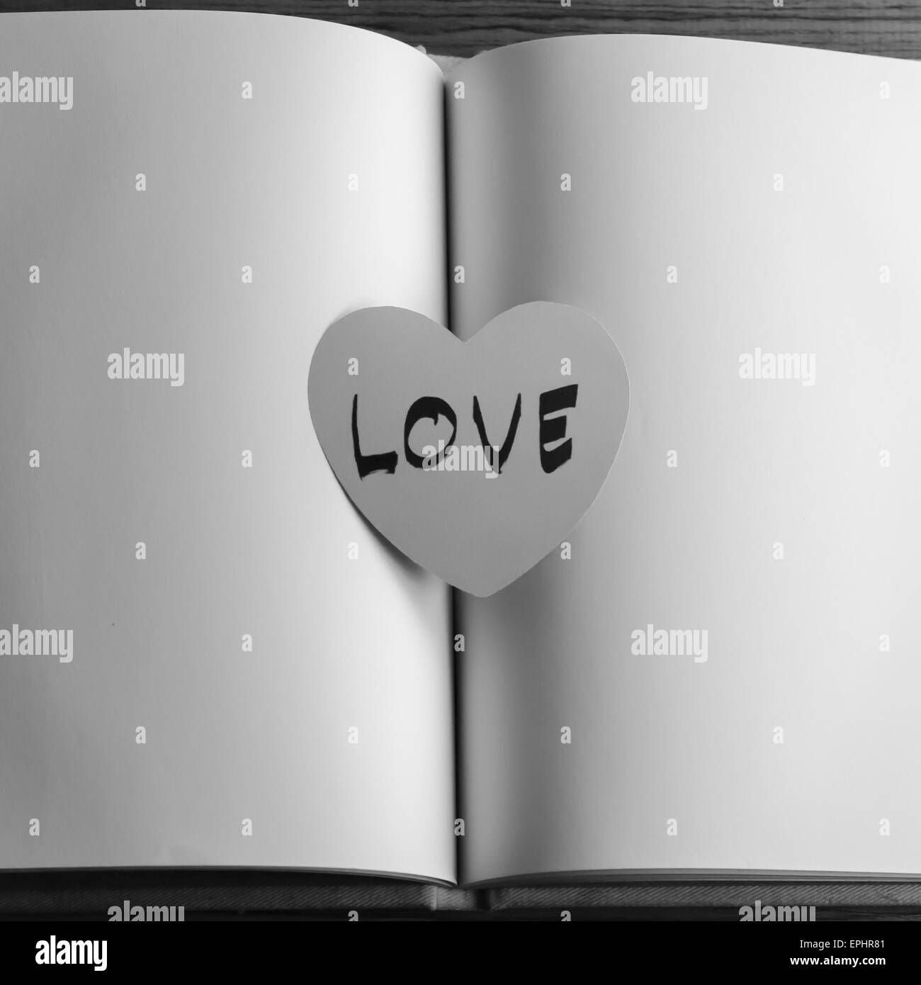black and white paper heart write love word word Stock Photo - Alamy