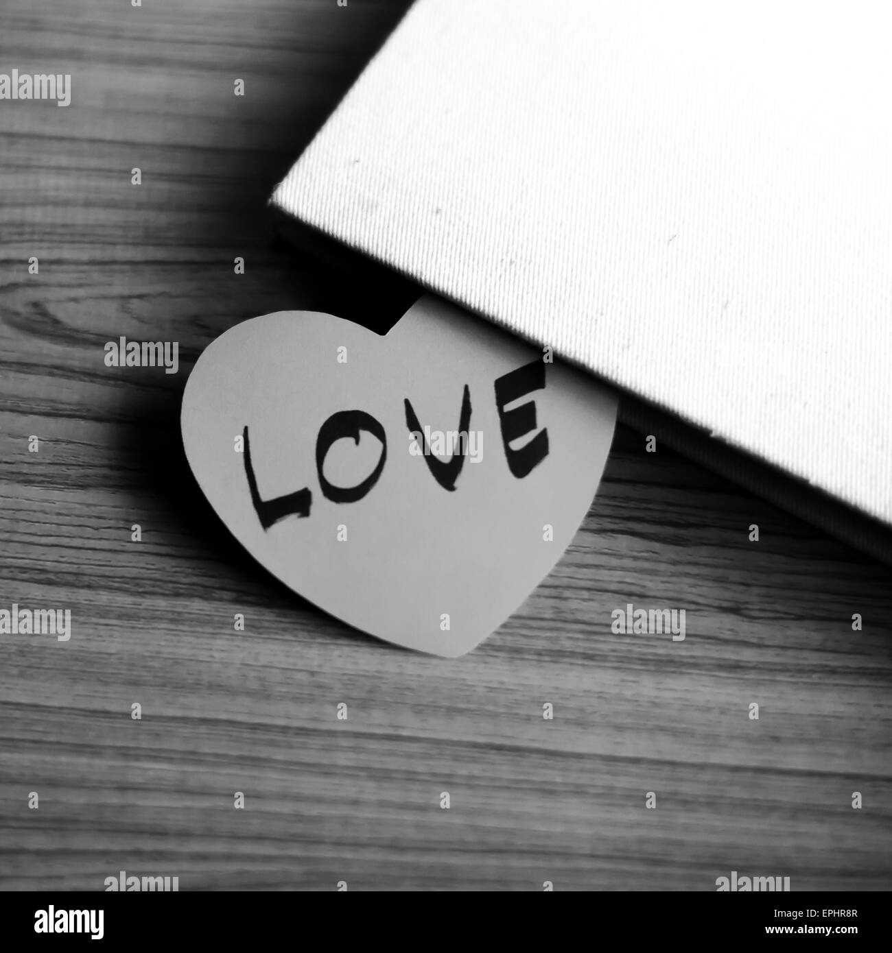 black and white paper heart write love word word Stock Photo - Alamy
