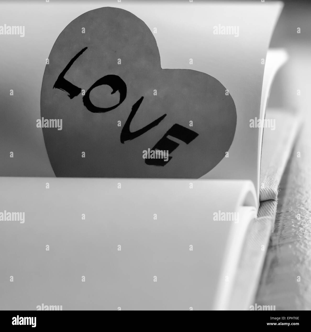 black and white paper heart write love word word Stock Photo - Alamy
