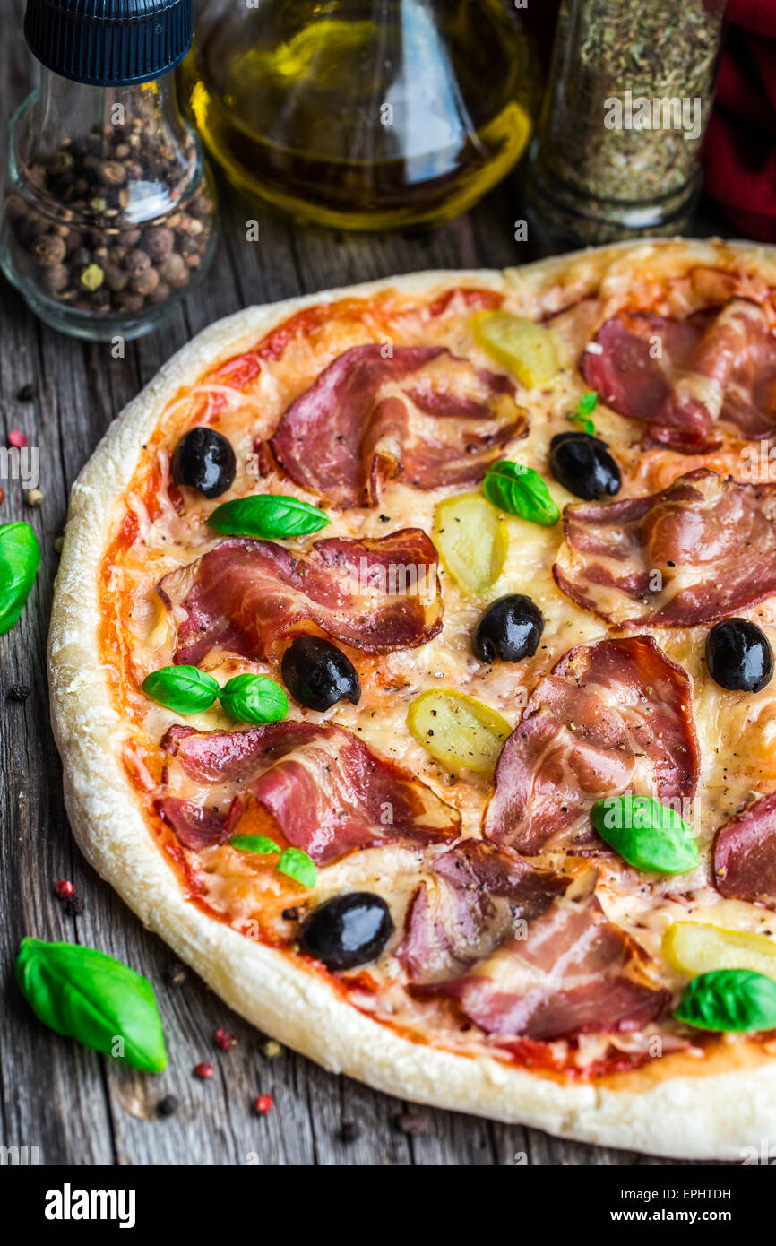Pizza with bacon Stock Photo - Alamy