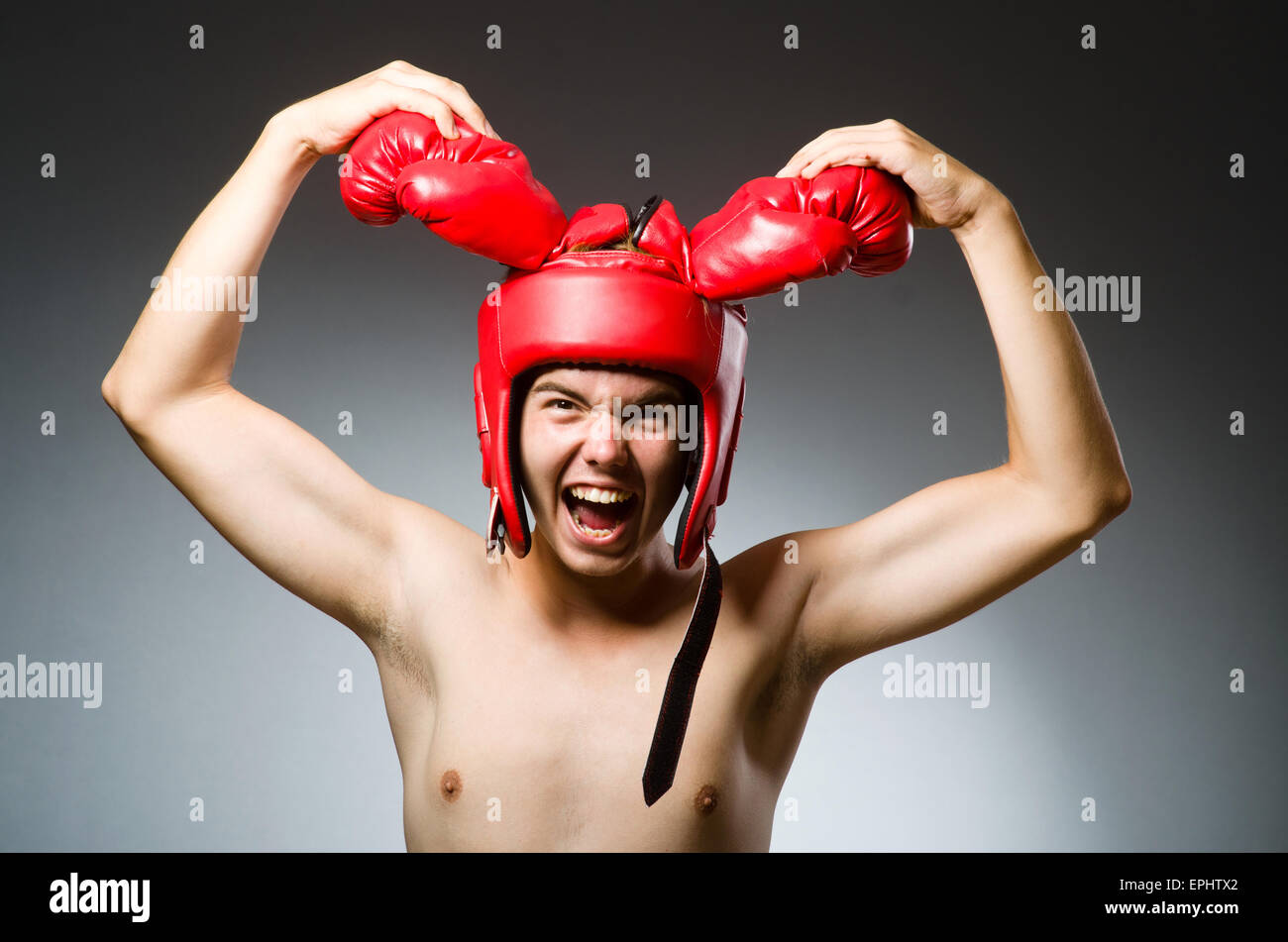 Funny boxer against dark background Stock Photo - Alamy
