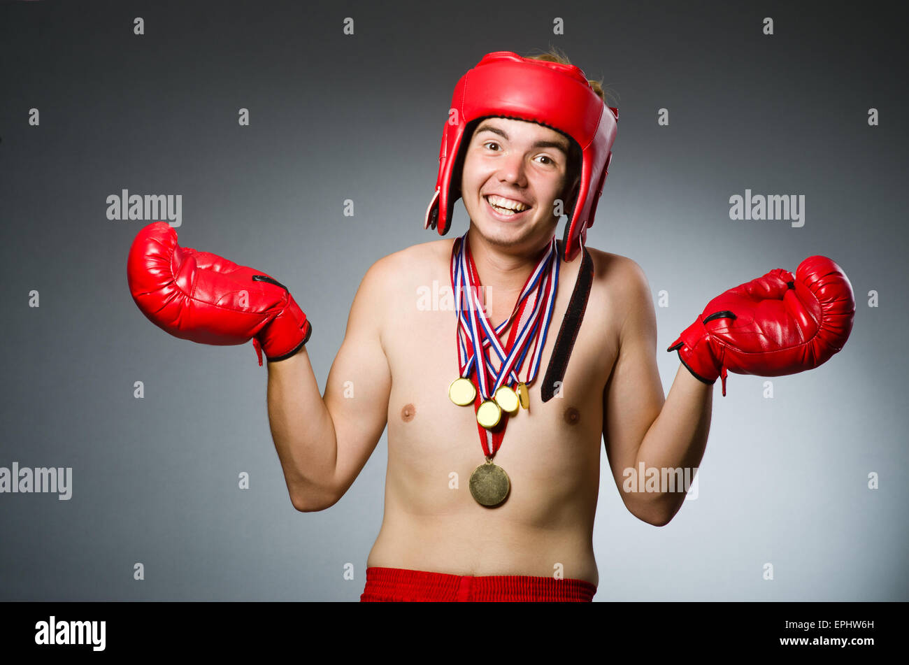 Funny boxer with winning gold medal Stock Photo - Alamy