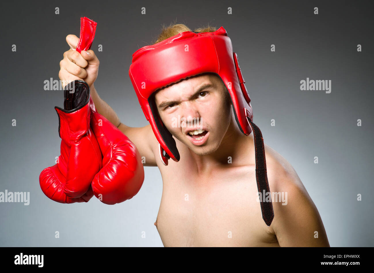 Funny boxer against dark background Stock Photo - Alamy