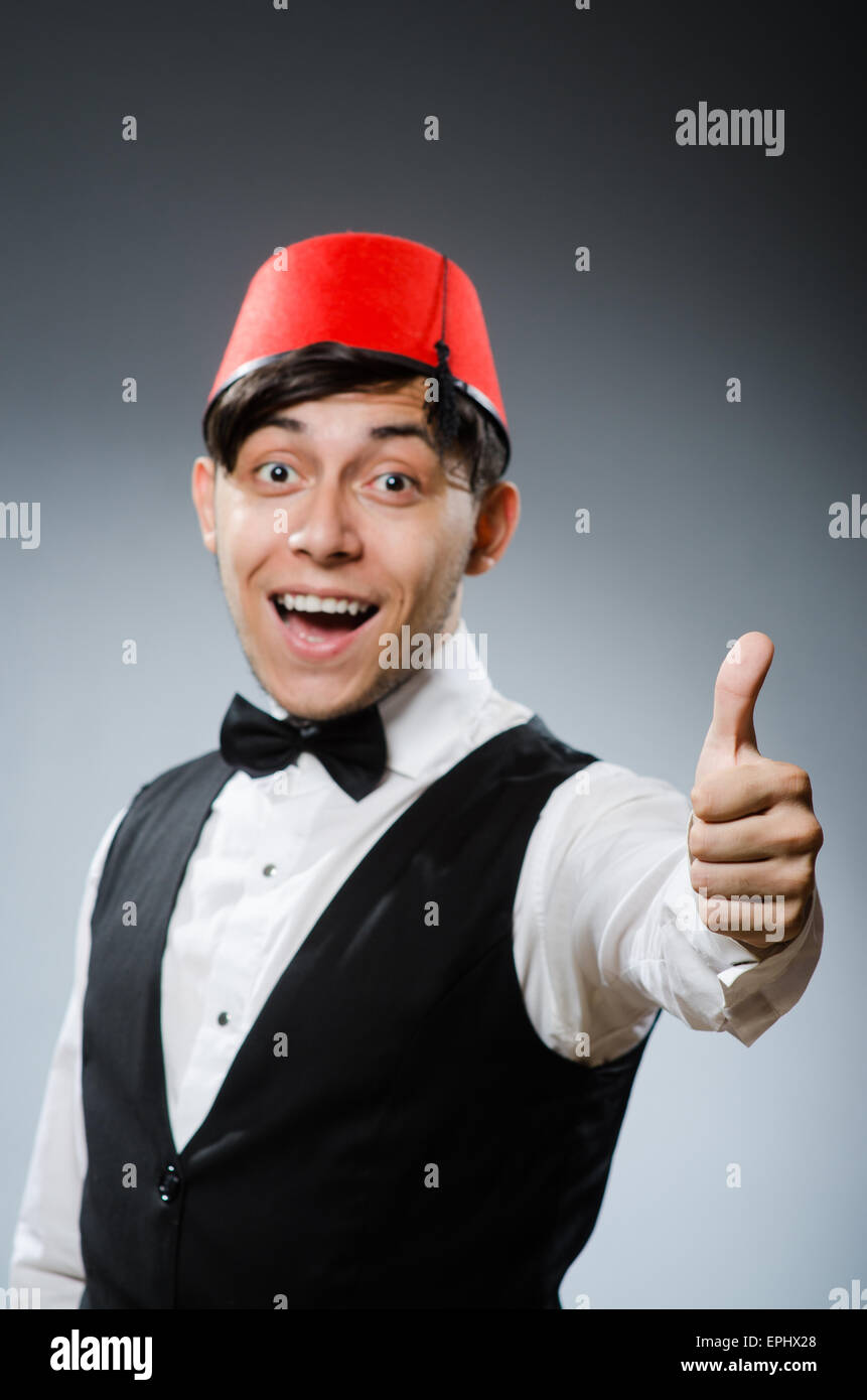 Man wearing traditional turkish hat fez Stock Photo - Alamy