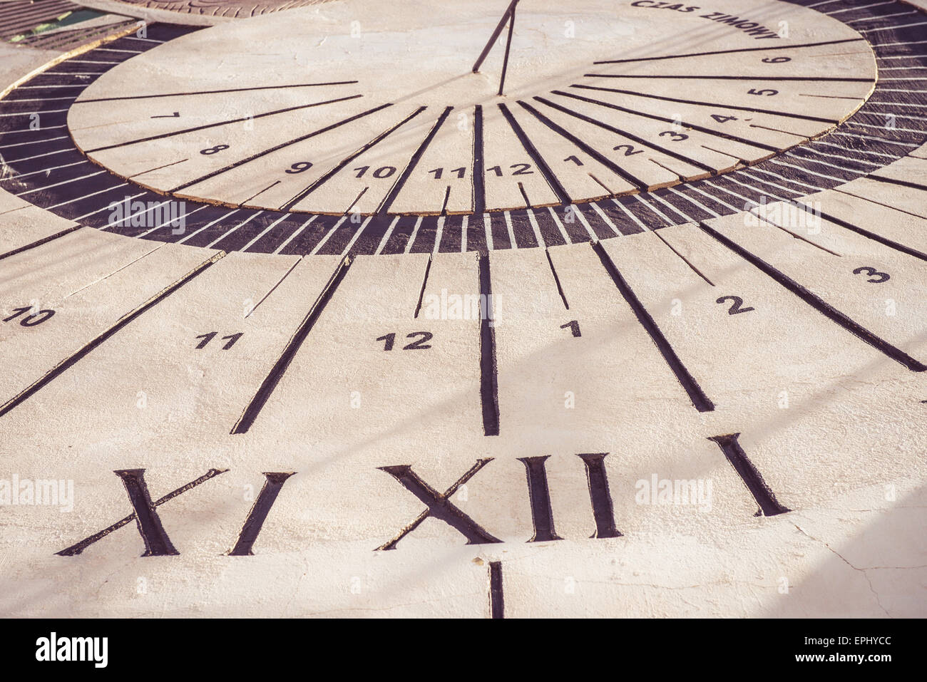 Old massive sun calendar and clock Stock Photo - Alamy