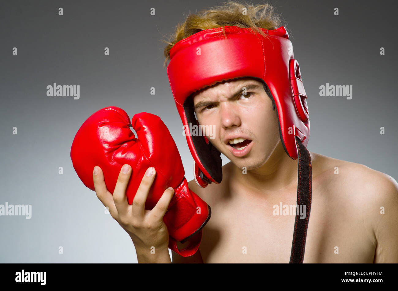 Funny boxer against dark background Stock Photo - Alamy