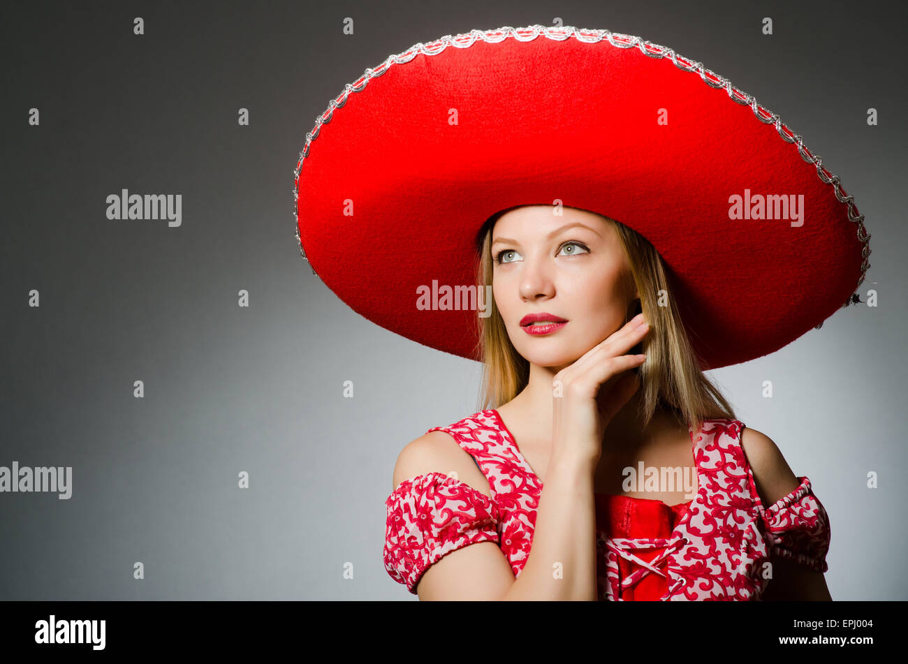 Woman wearing nice red sombrero Stock Photo - Alamy