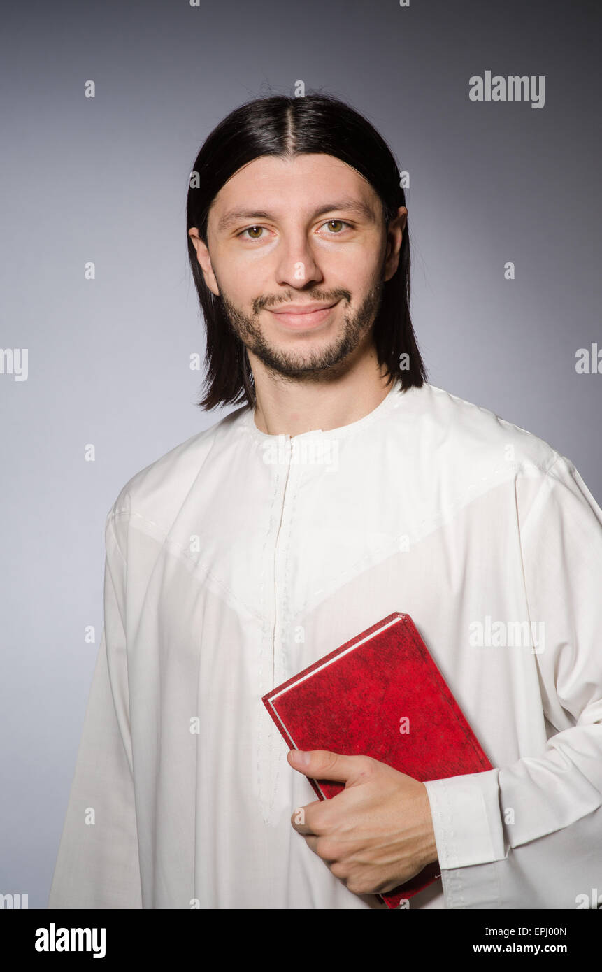 Priest cross robe religion church holy man black hi-res stock ...