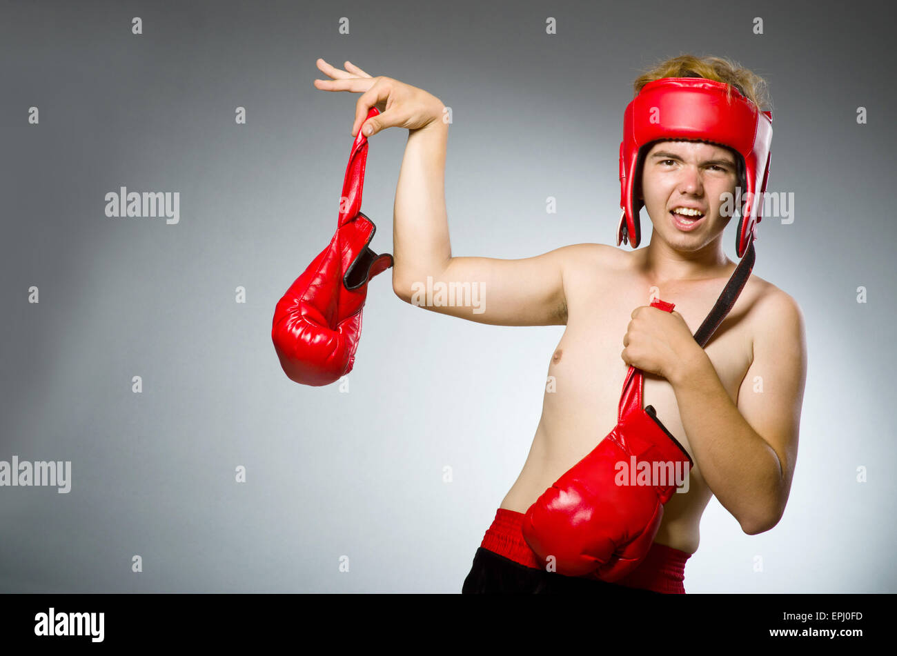 Funny boxer against dark background Stock Photo - Alamy