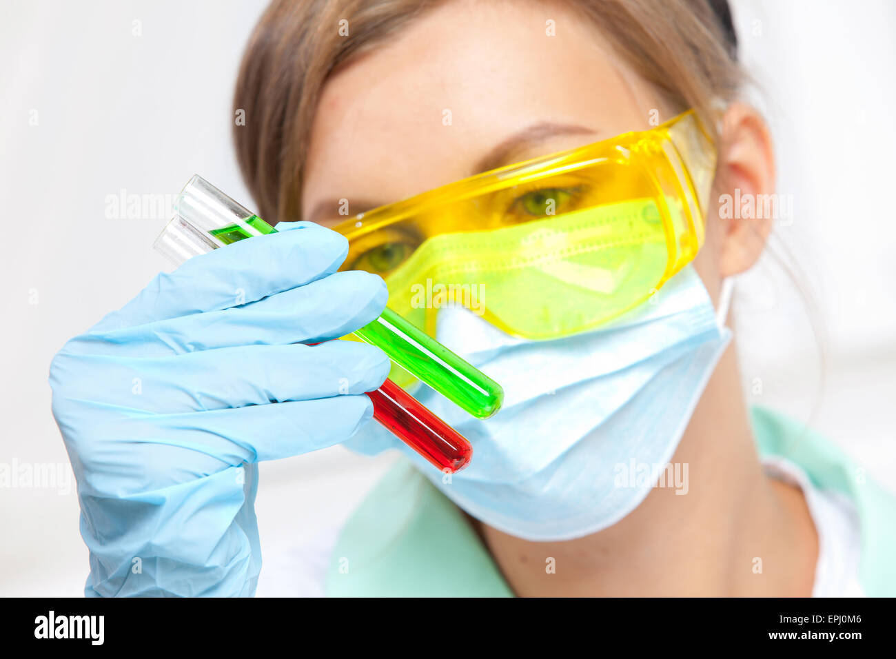 Doctor with test tubes hi-res stock photography and images - Alamy