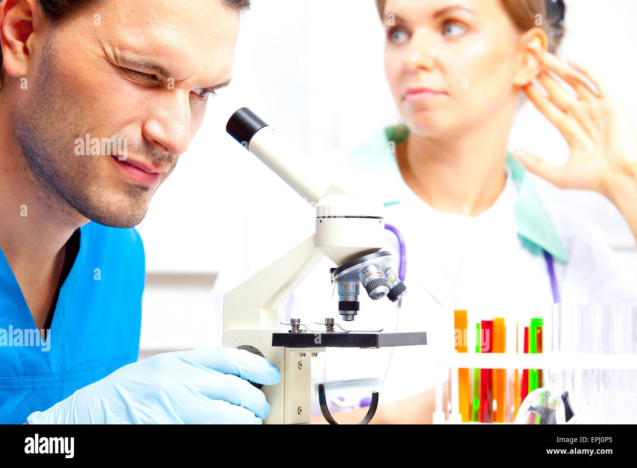Medical researchers microscope hi-res stock photography and images - Alamy