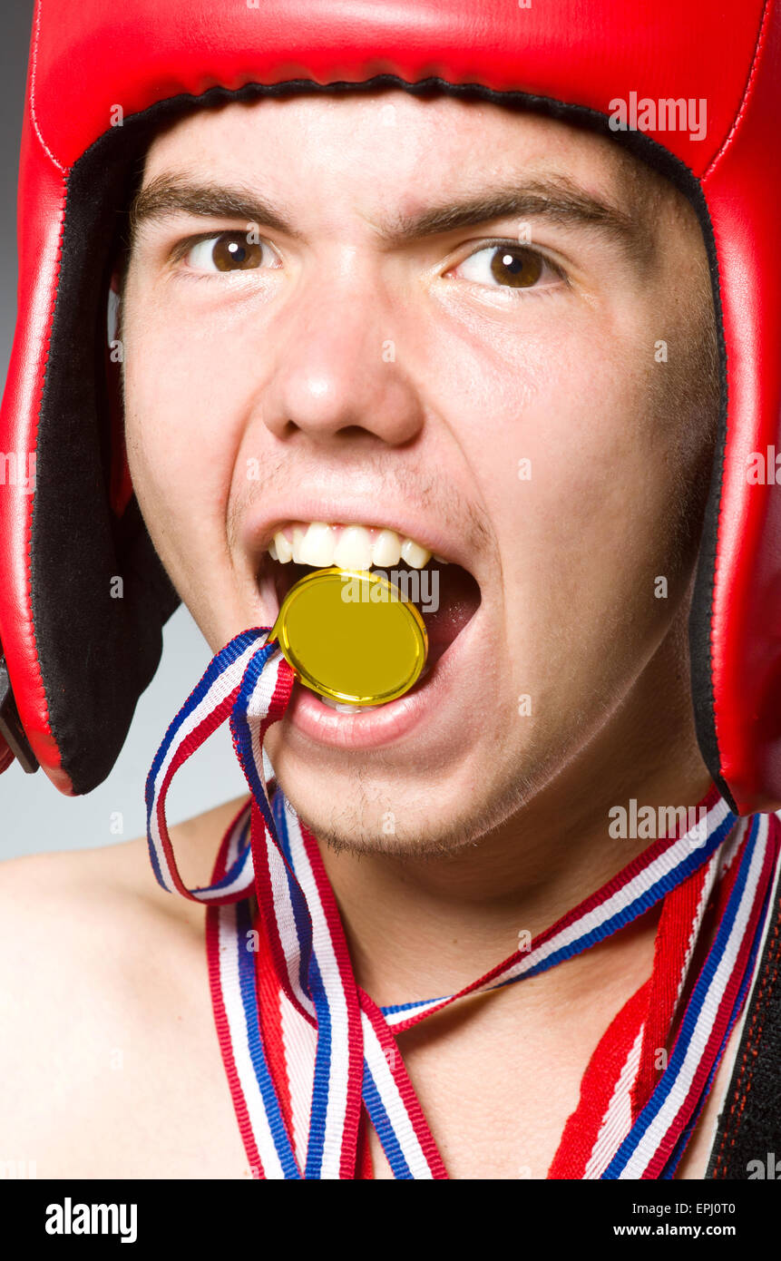 Funny boxer with winning gold medal Stock Photo - Alamy