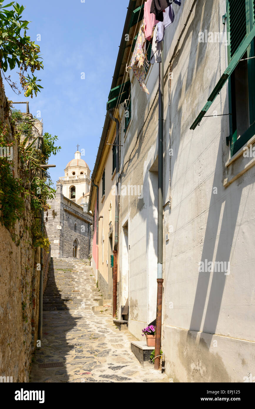 view of narrow uphill lane in medieval village leading to San Lorenzo ...