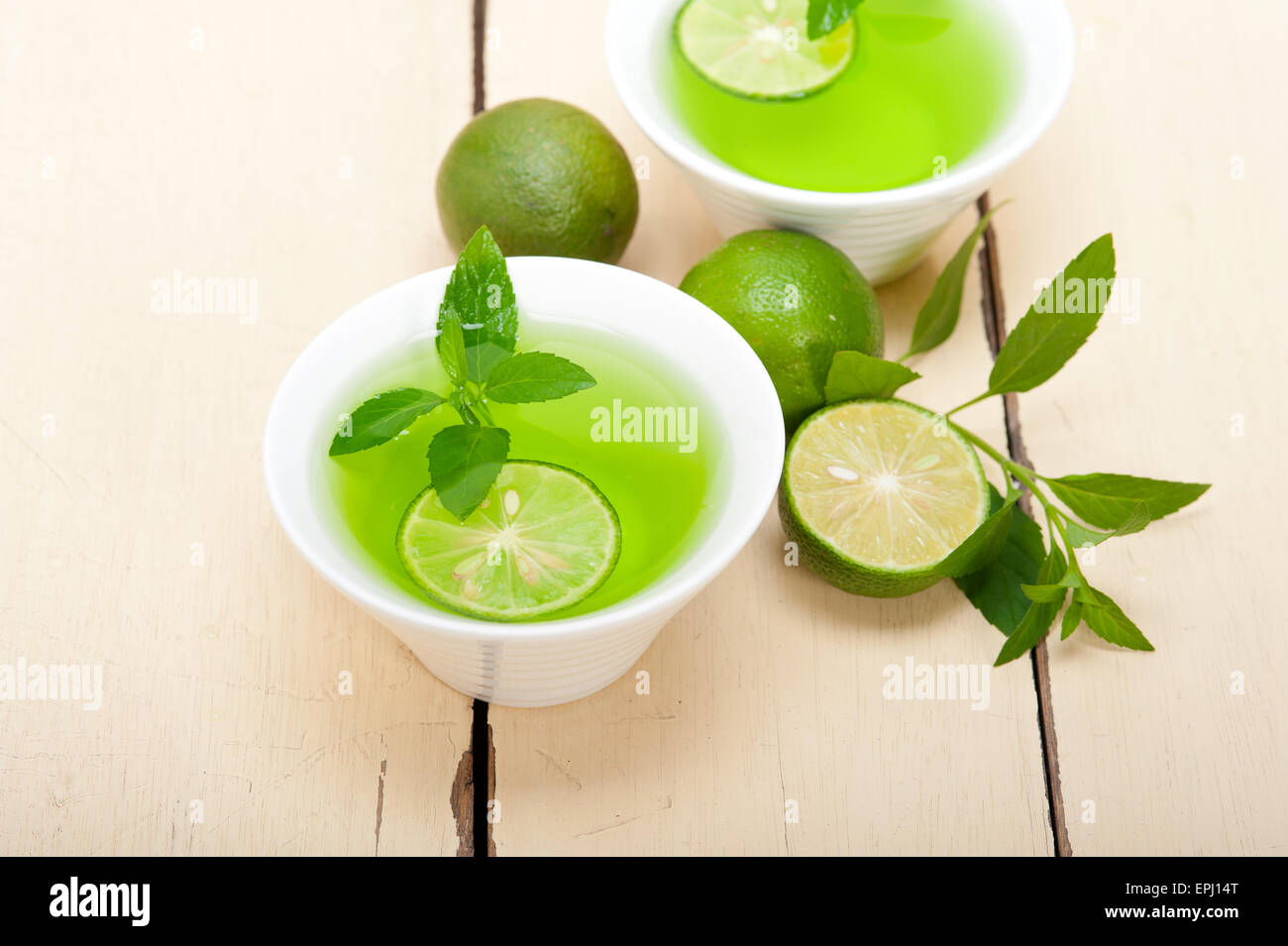 mint infusion tea tisane with lime Stock Photo - Alamy