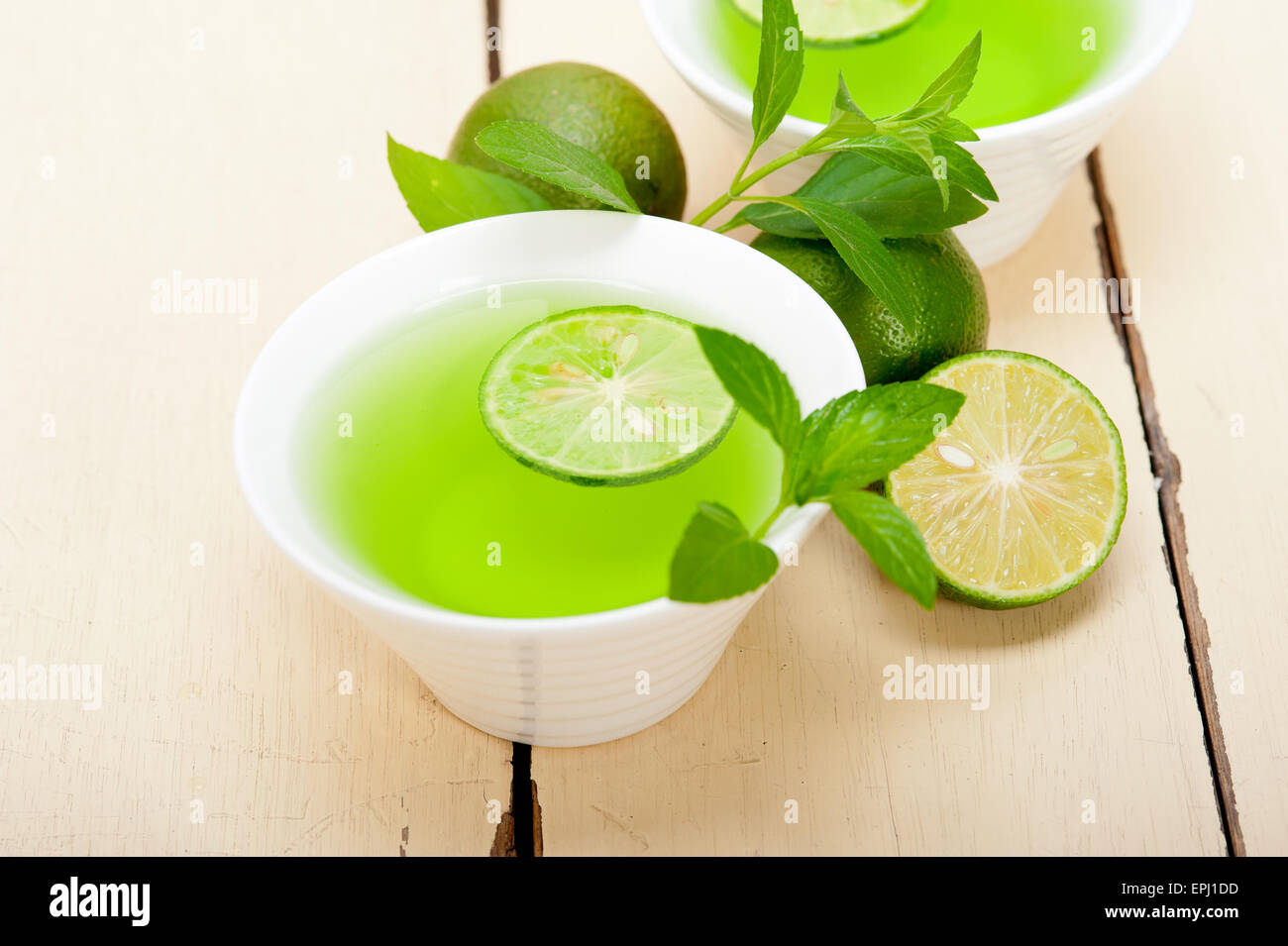 mint infusion tea tisane with lime Stock Photo - Alamy