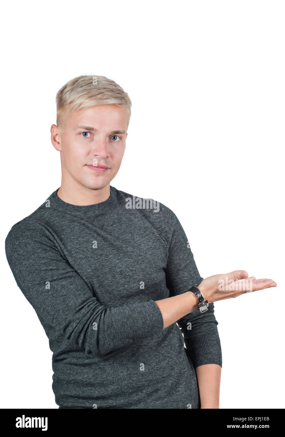 Young handsome guy holding something Stock Photo - Alamy