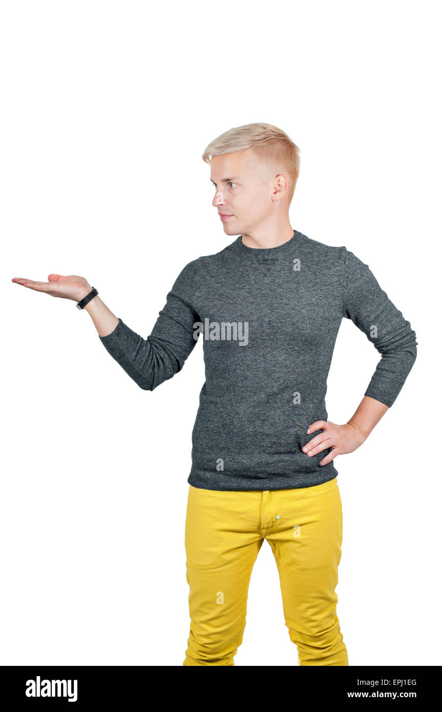 Young handsome man holding something Stock Photo - Alamy