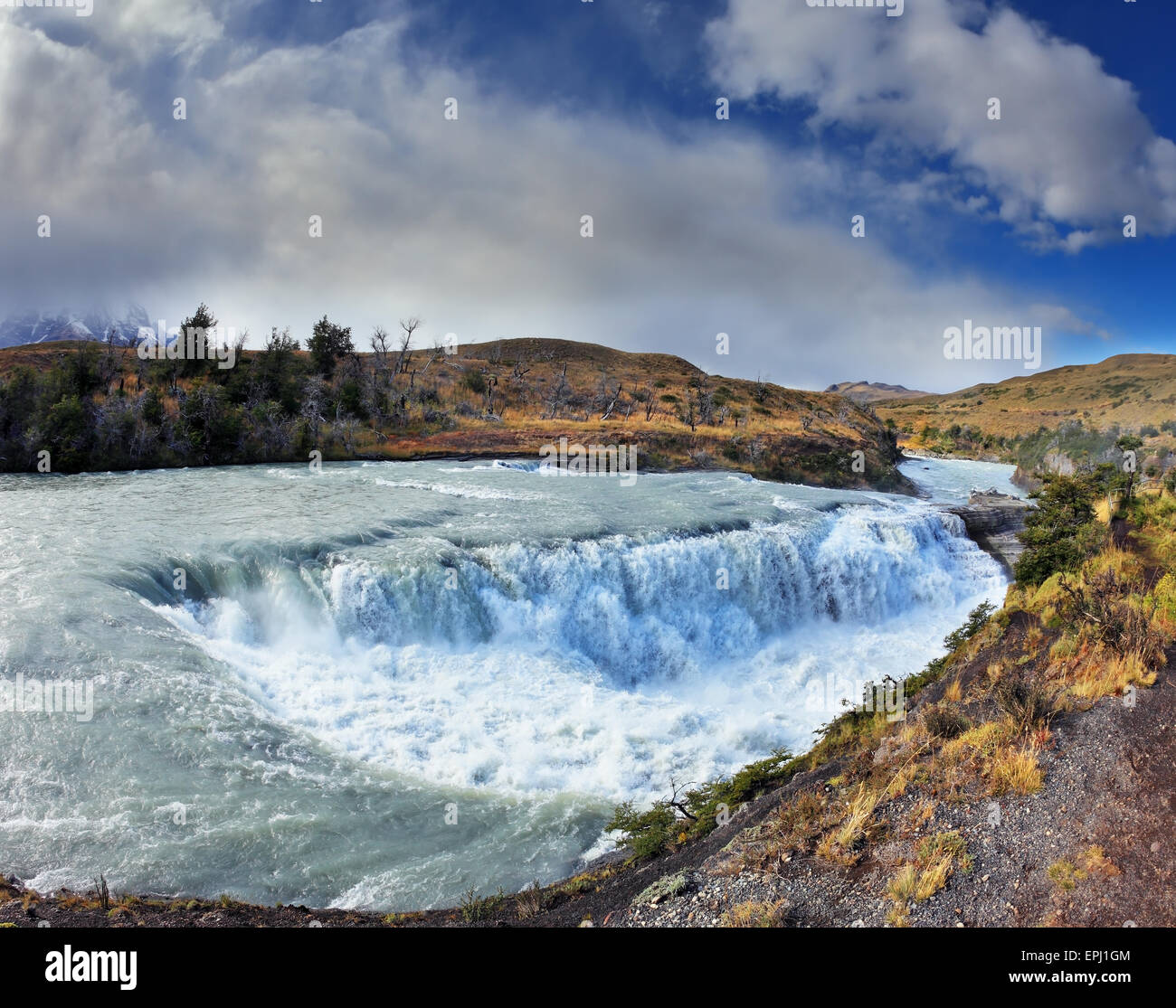 The raging waterfall on the Rio Paine Stock Photo - Alamy