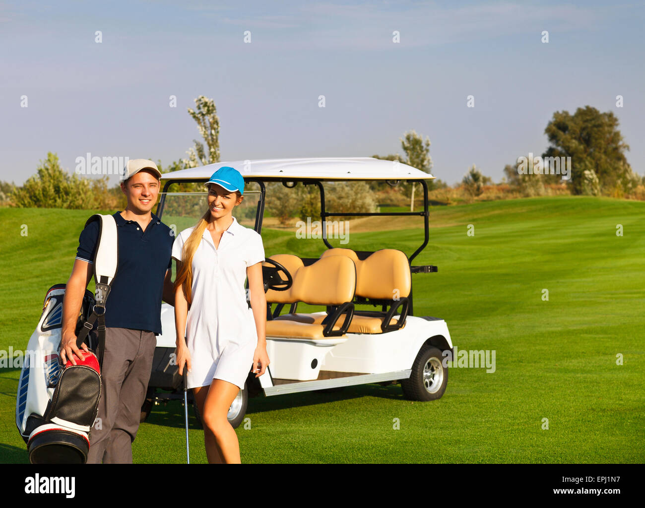Two couple playing golf together hi-res stock photography and images ...