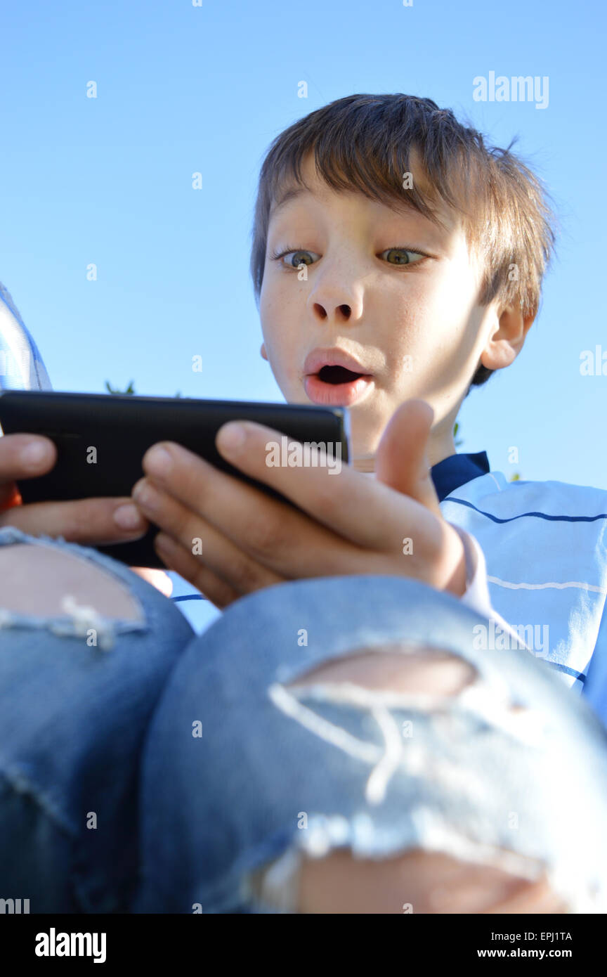 boy with smartphone Stock Photo - Alamy