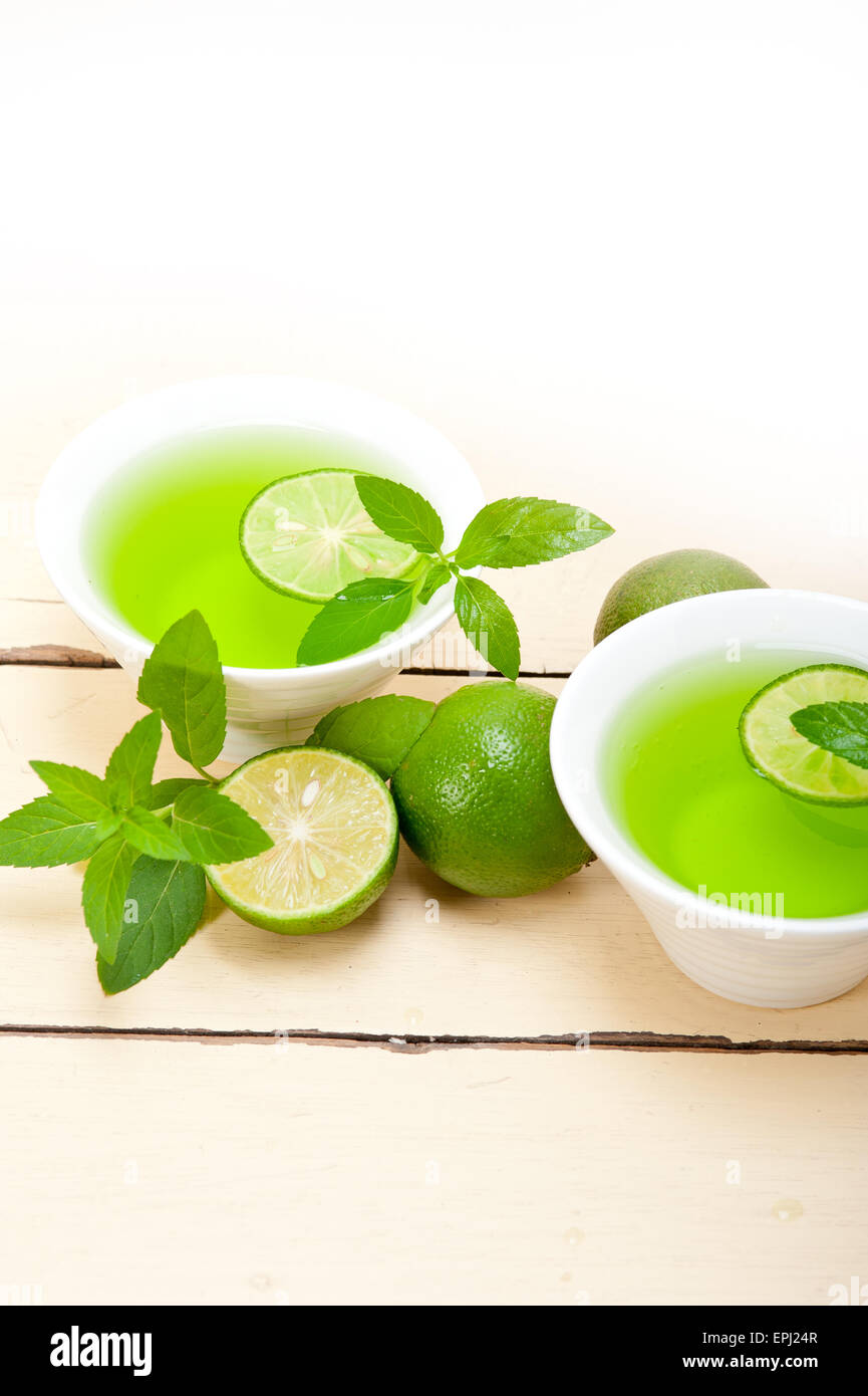mint infusion tea tisane with lime Stock Photo - Alamy