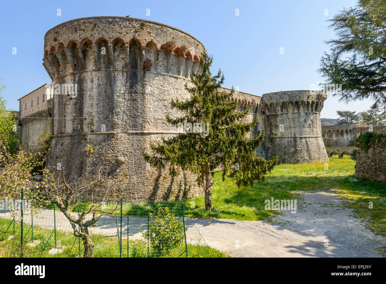 view of walls and round dungeons on ancient Castle dry moat, shot on a ...