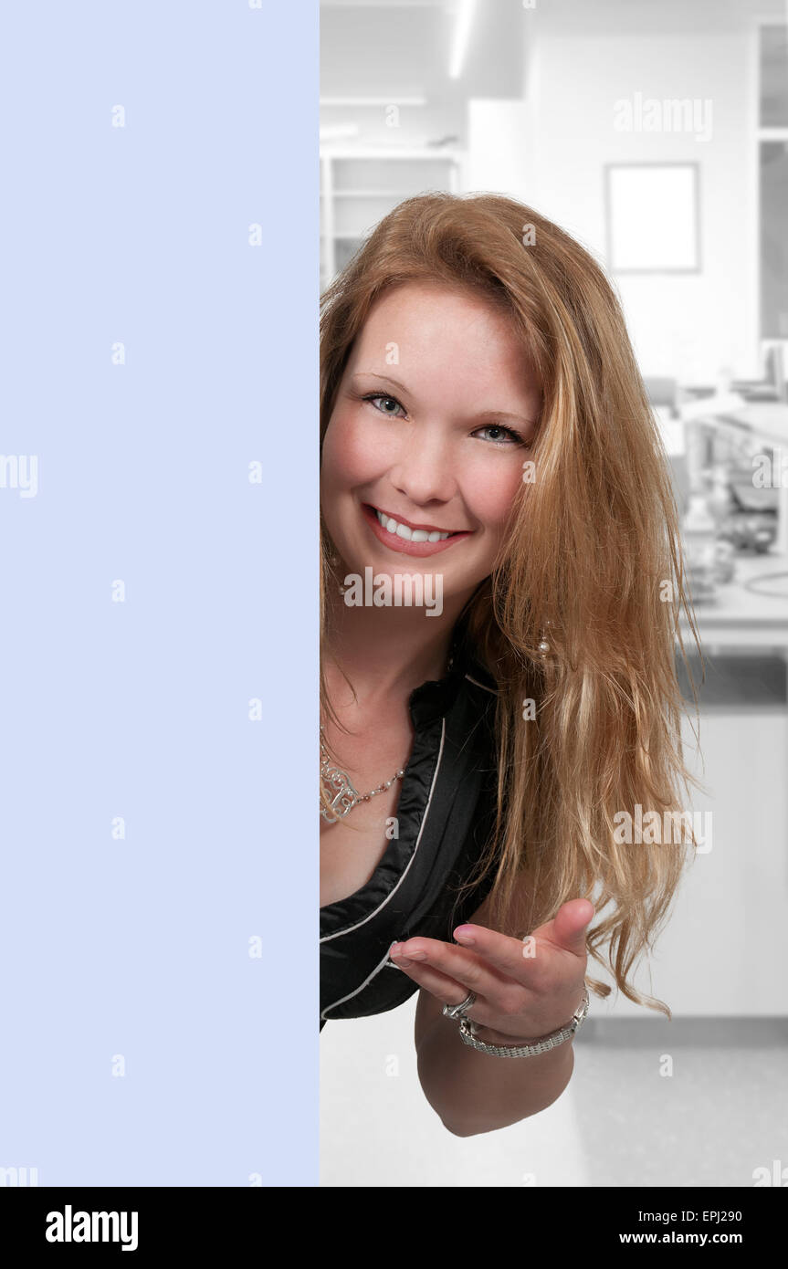 Beautiful girl behind empty board hi-res stock photography and images ...