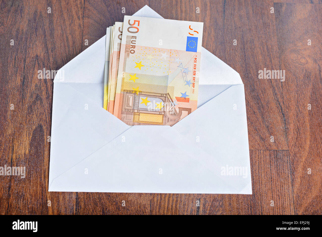 Envelope on table hi-res stock photography and images - Alamy