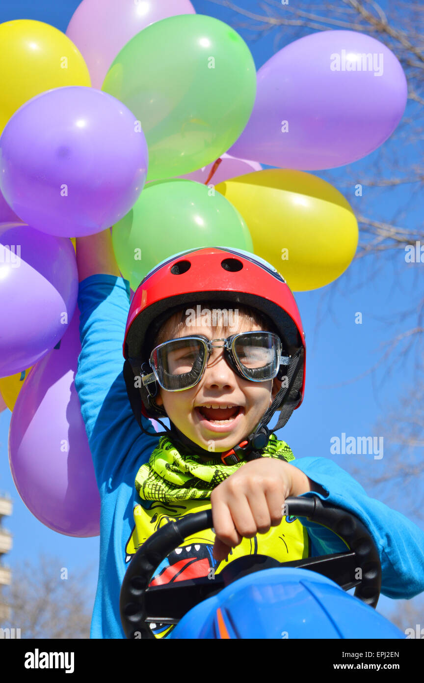 boy with balloons Stock Photo - Alamy