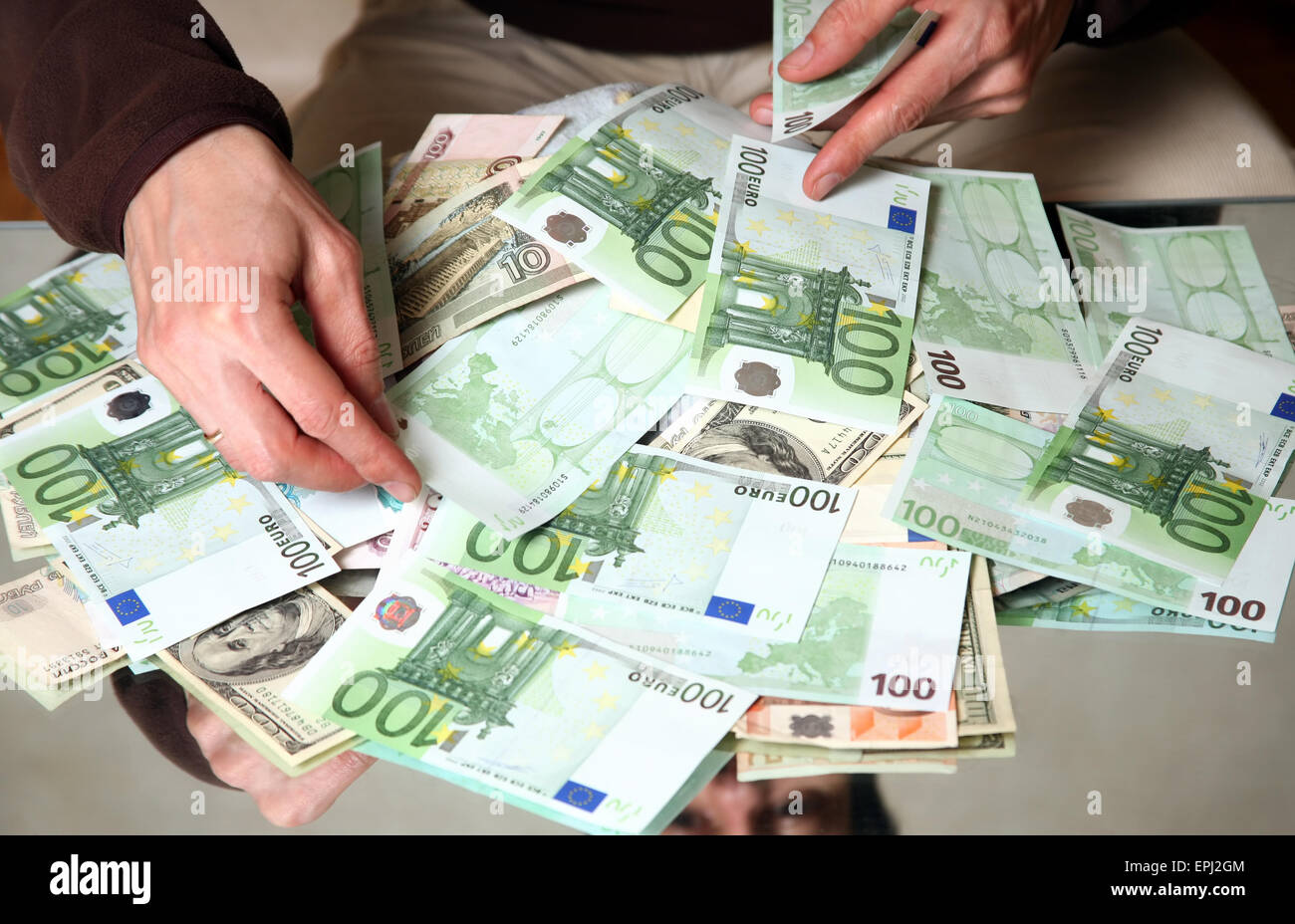 Heap of money Stock Photo - Alamy