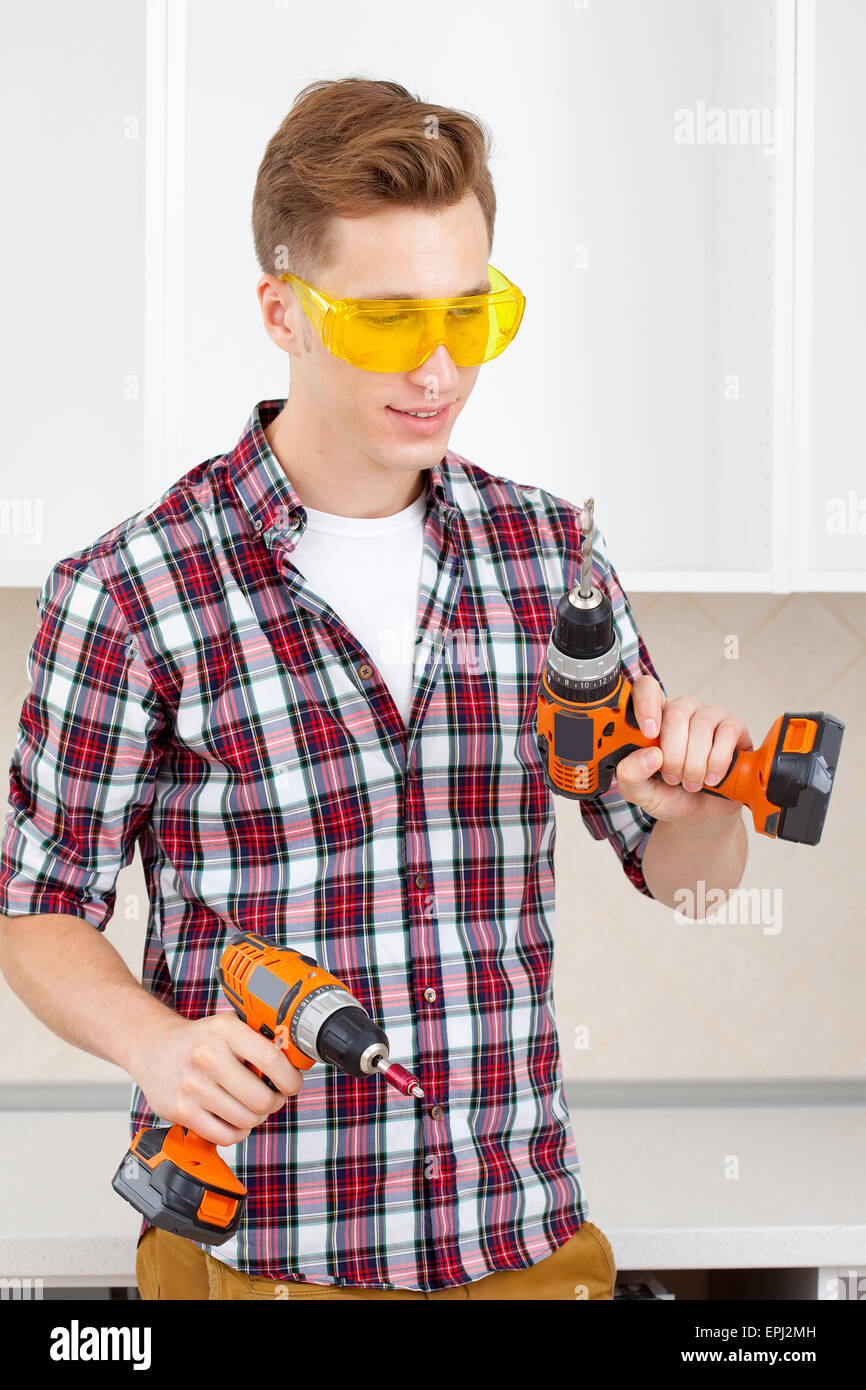worker with drill Stock Photo - Alamy