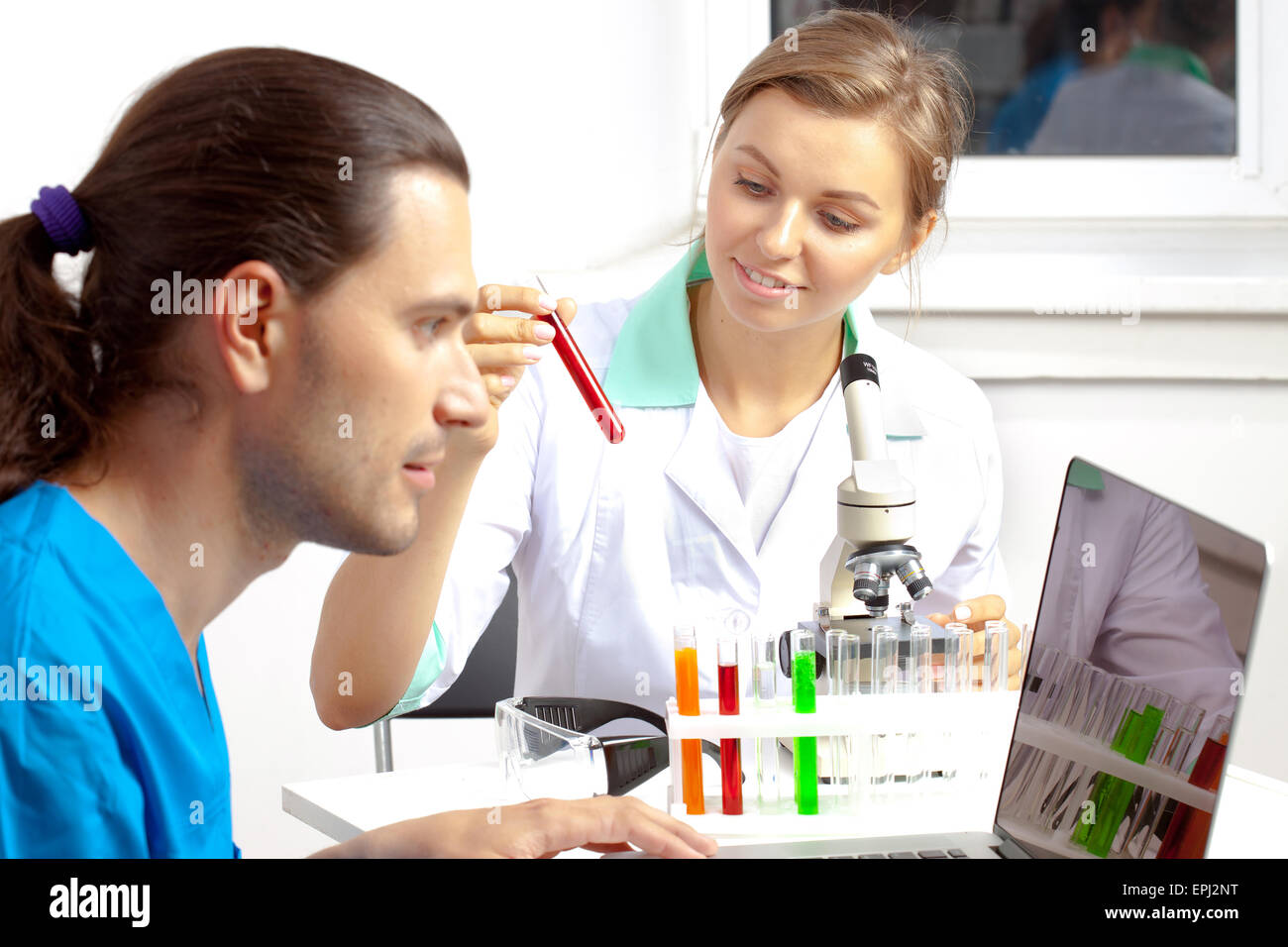 scientists working at the laboratory Stock Photo - Alamy