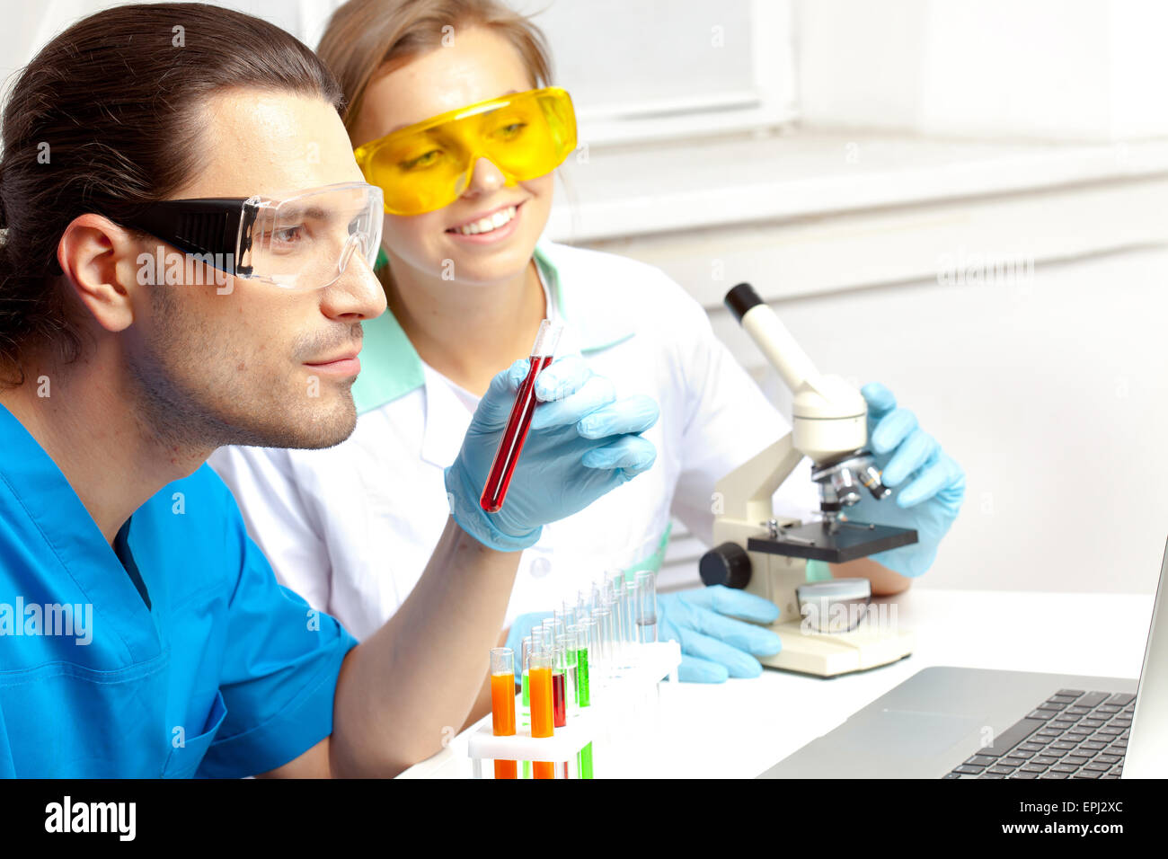 Doctors analyze hi-res stock photography and images - Alamy