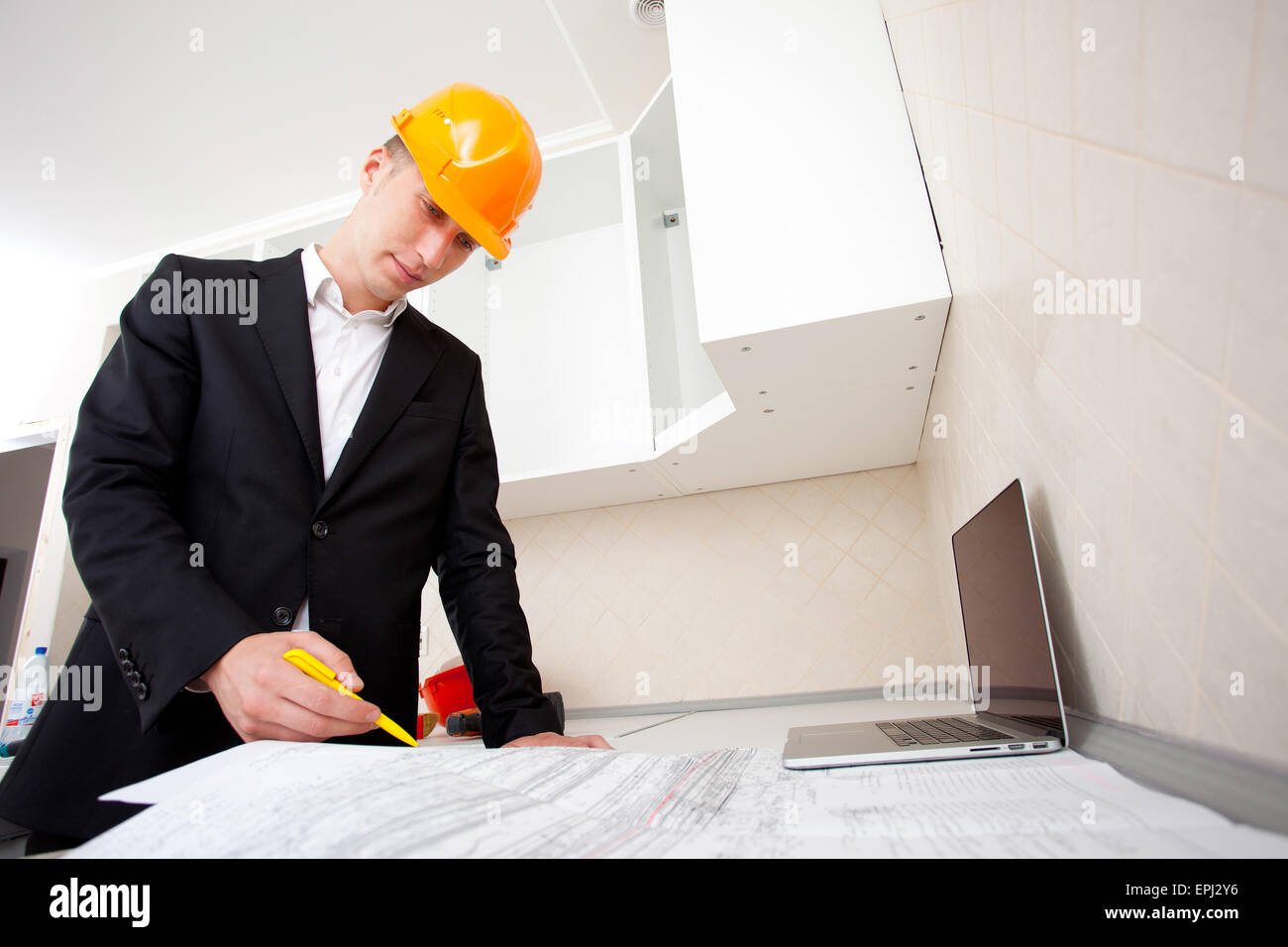 foreman with blueprints Stock Photo - Alamy
