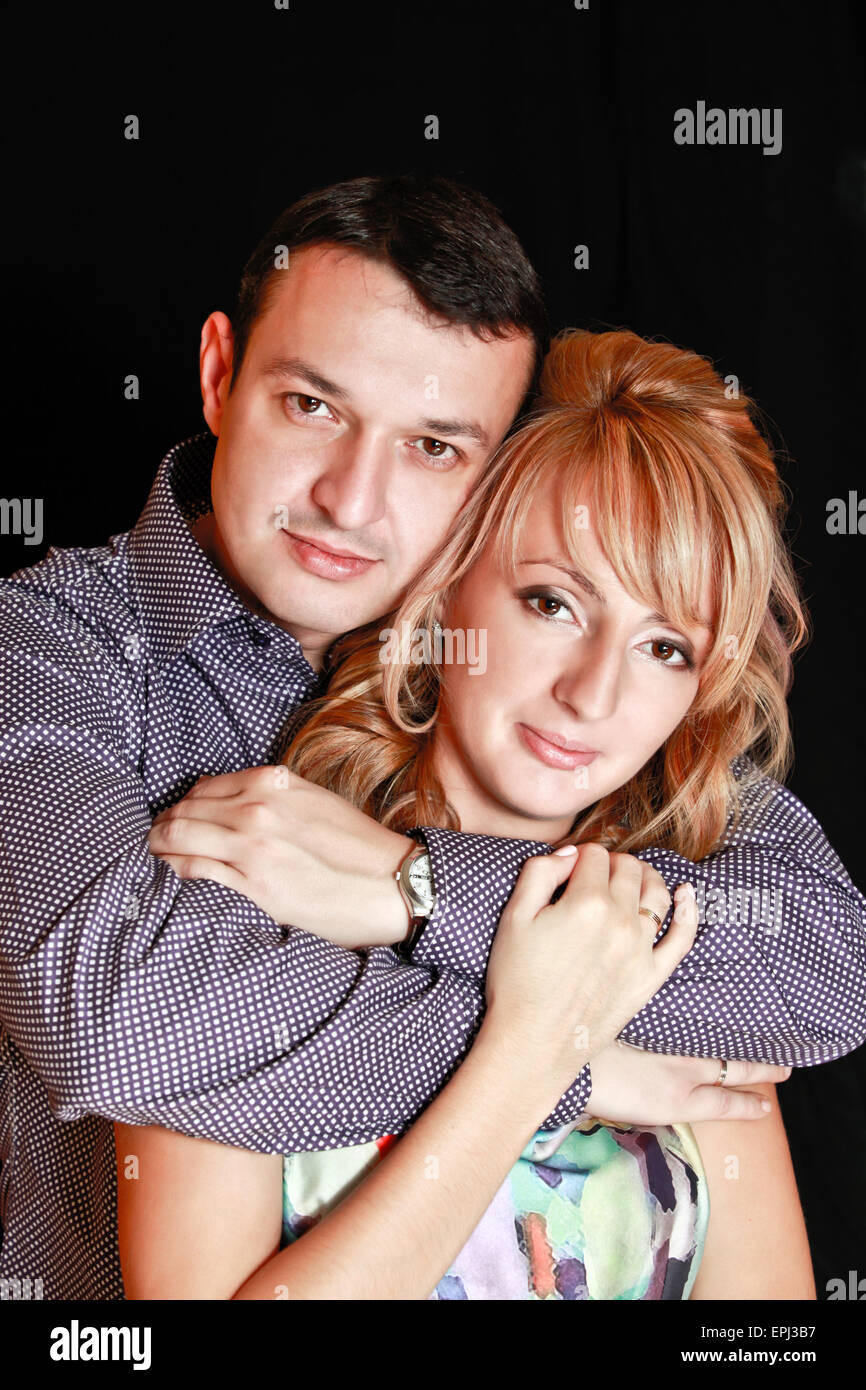 Couple in love smiling Stock Photo - Alamy