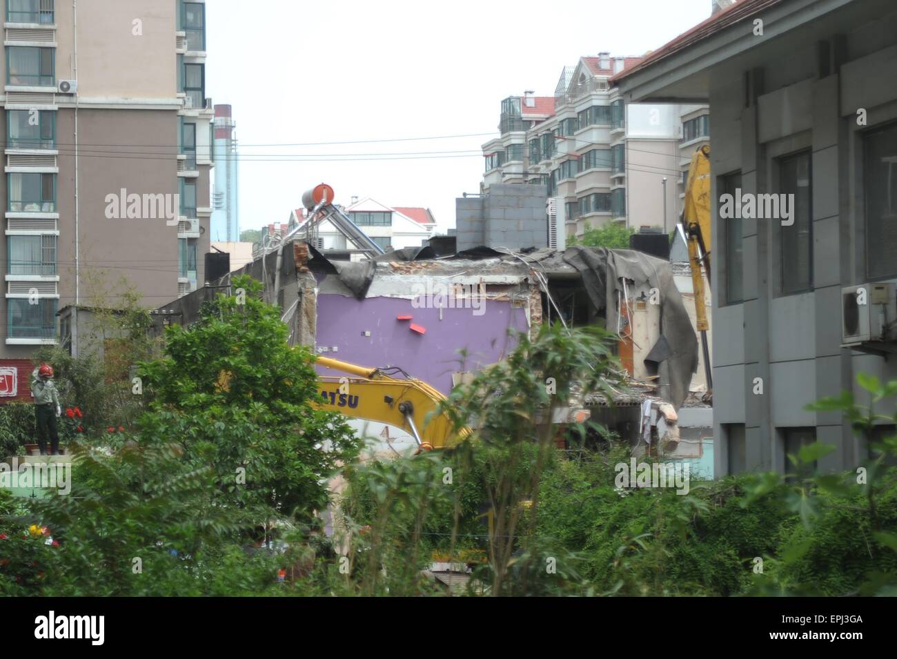 Qingdao. 19th May, 2015. Rescuers work at a gas explosion site in ...