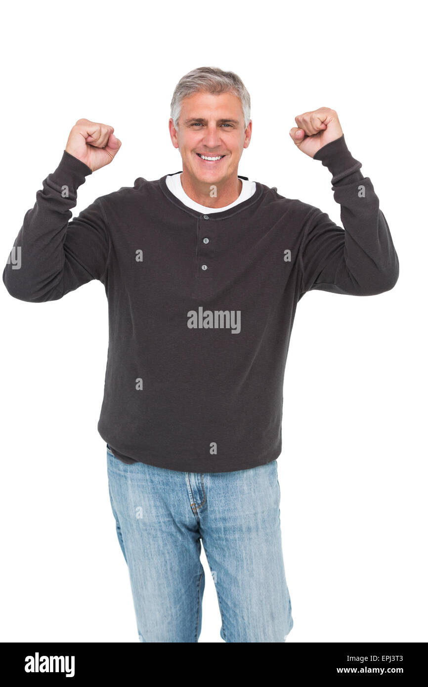 Casual man cheering at camera Stock Photo - Alamy