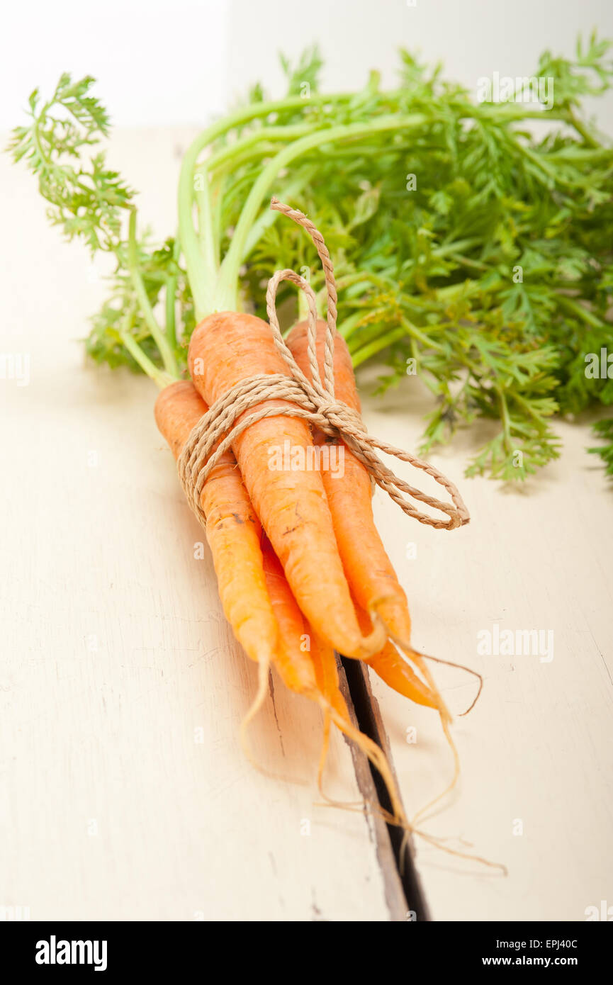 baby carrots bunch tied with rope Stock Photo - Alamy