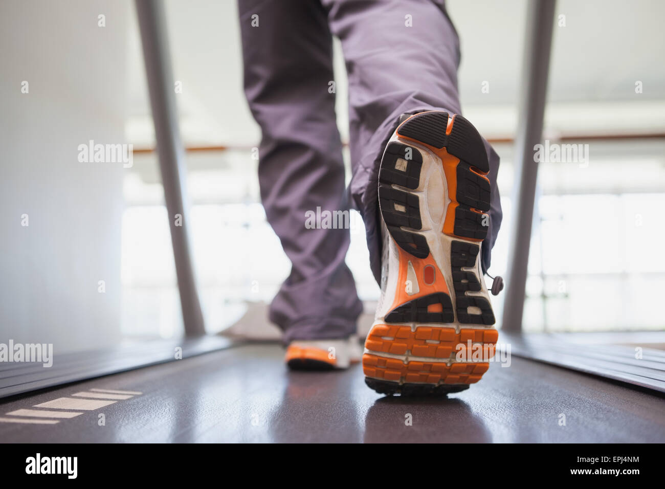Fit man working out on treadmill Stock Photo - Alamy